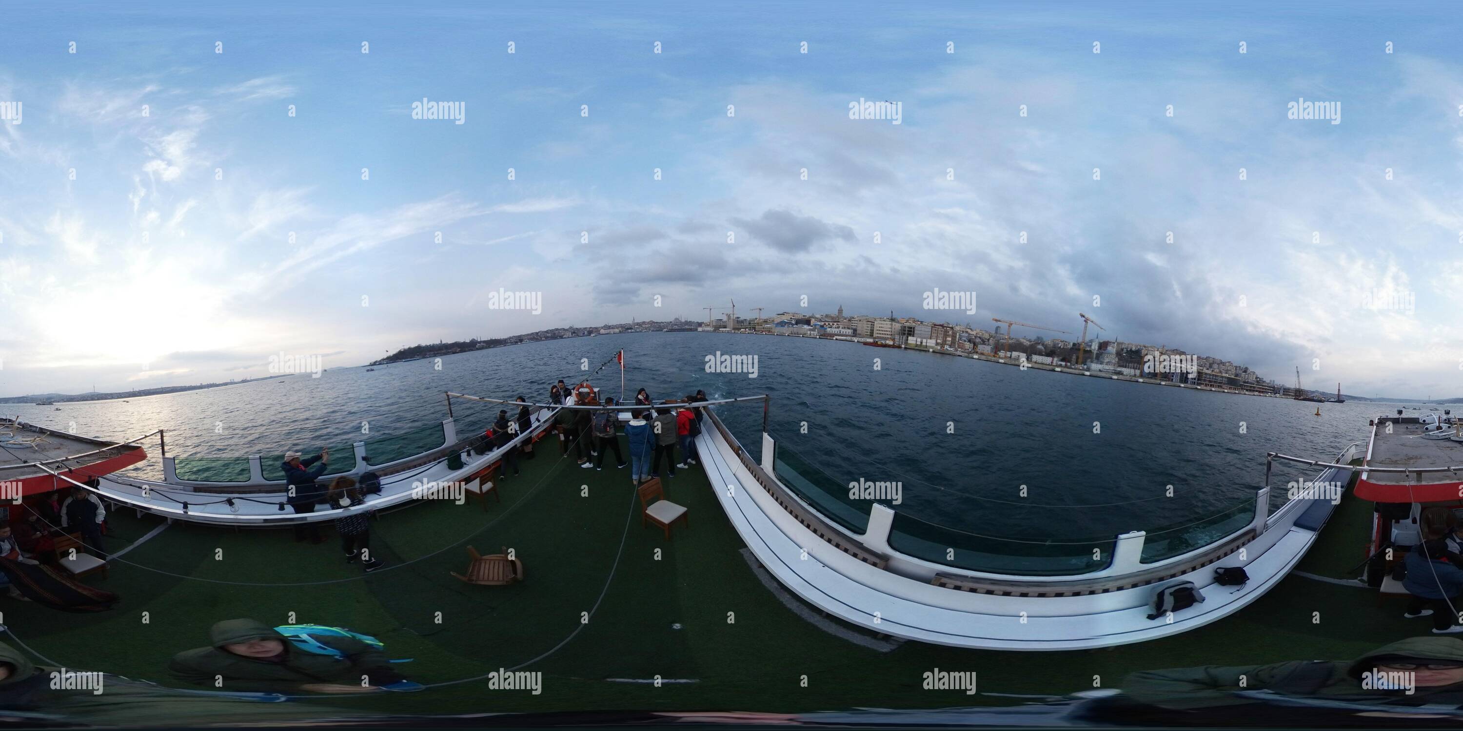 360° view of tourists on a private bosphorus cruise in Istanbul, Turkey ...