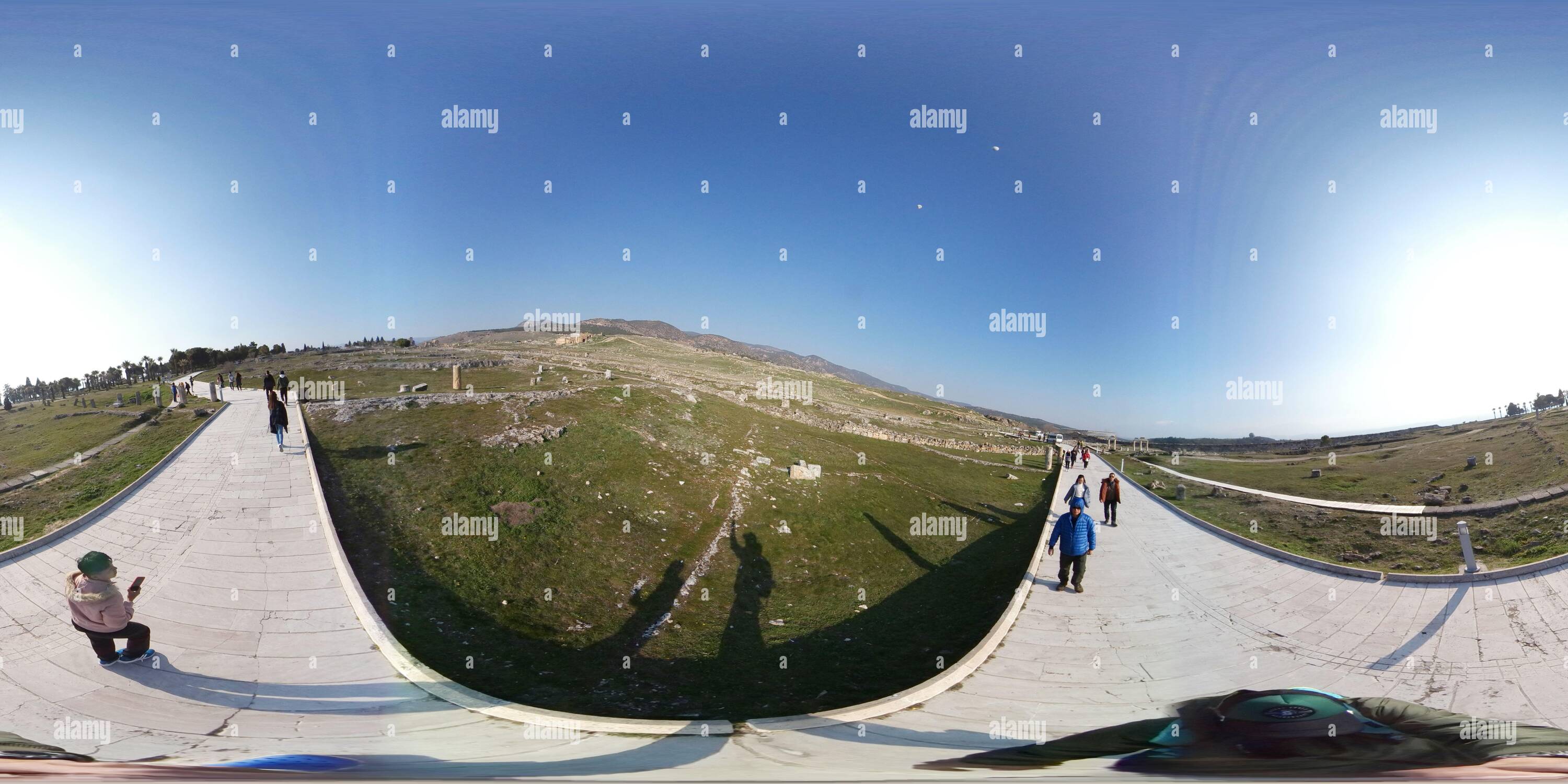 360° view of white lime cascades formed by hot mineral springs at ...