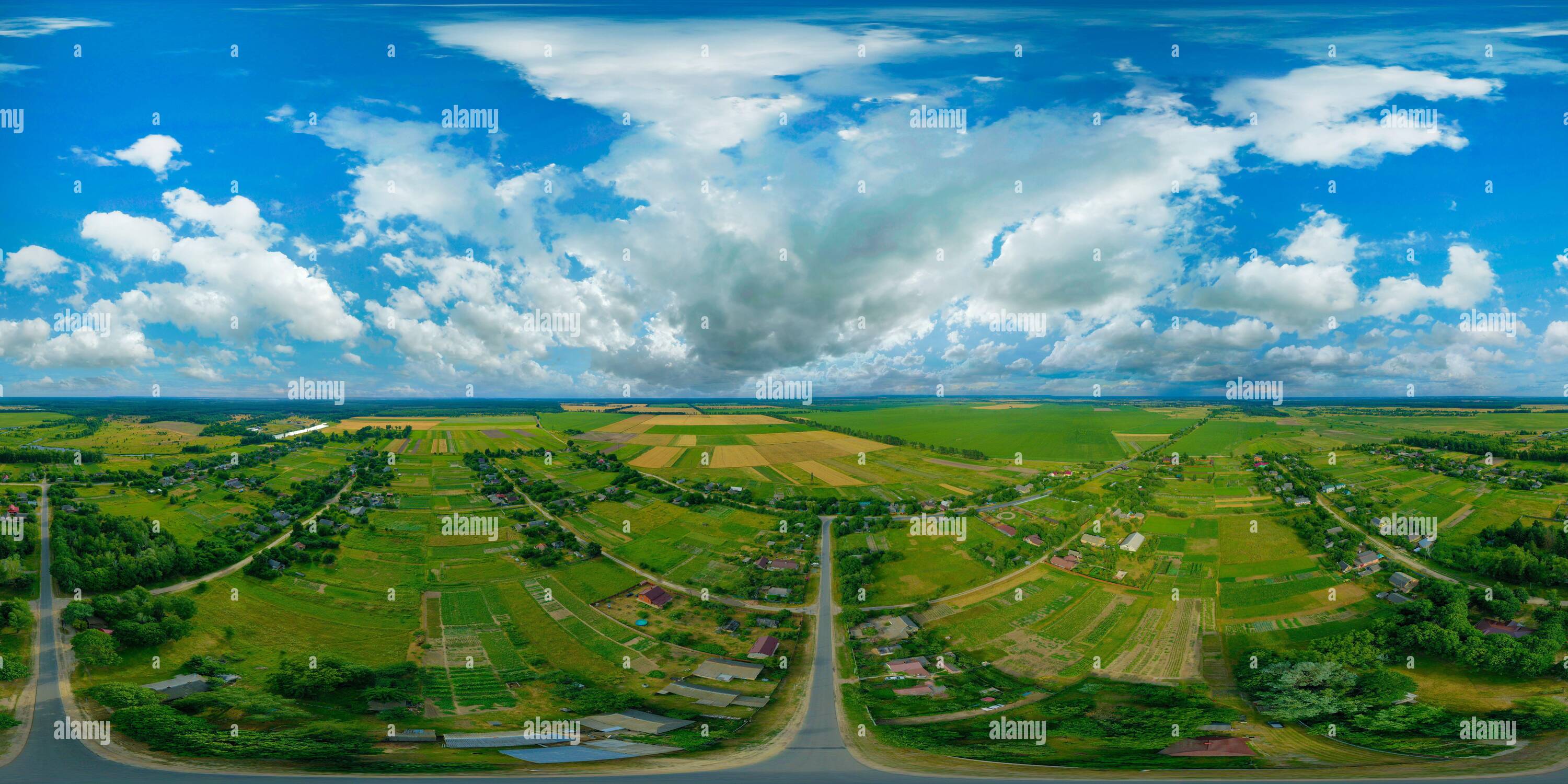 360° view of Aerial view of the countryside with village and fields of ...