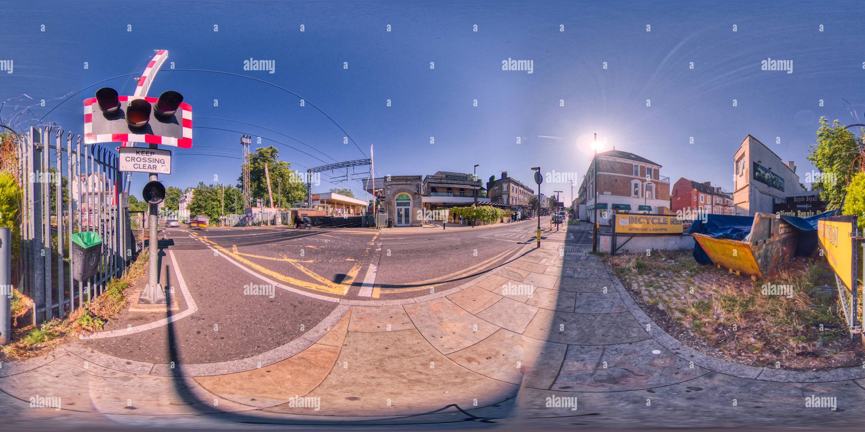 360° view of Train level crossing in Acton, West London - Alamy