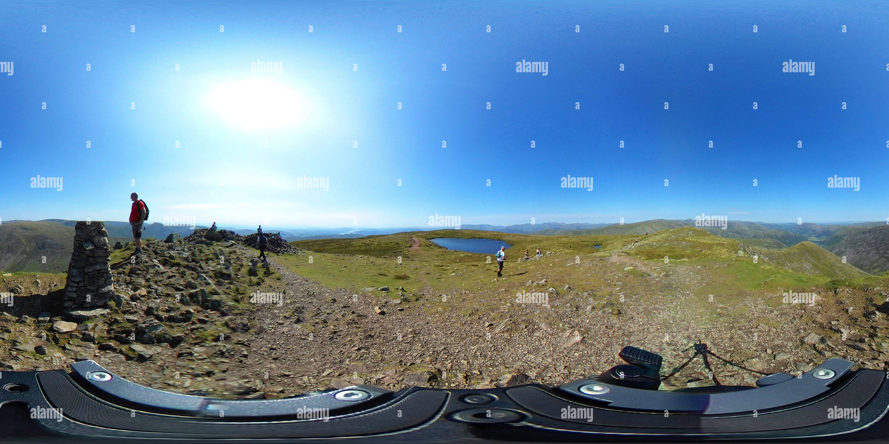360° view of Walker at the summit cairn of Red Screes fell, Kirkstone ...