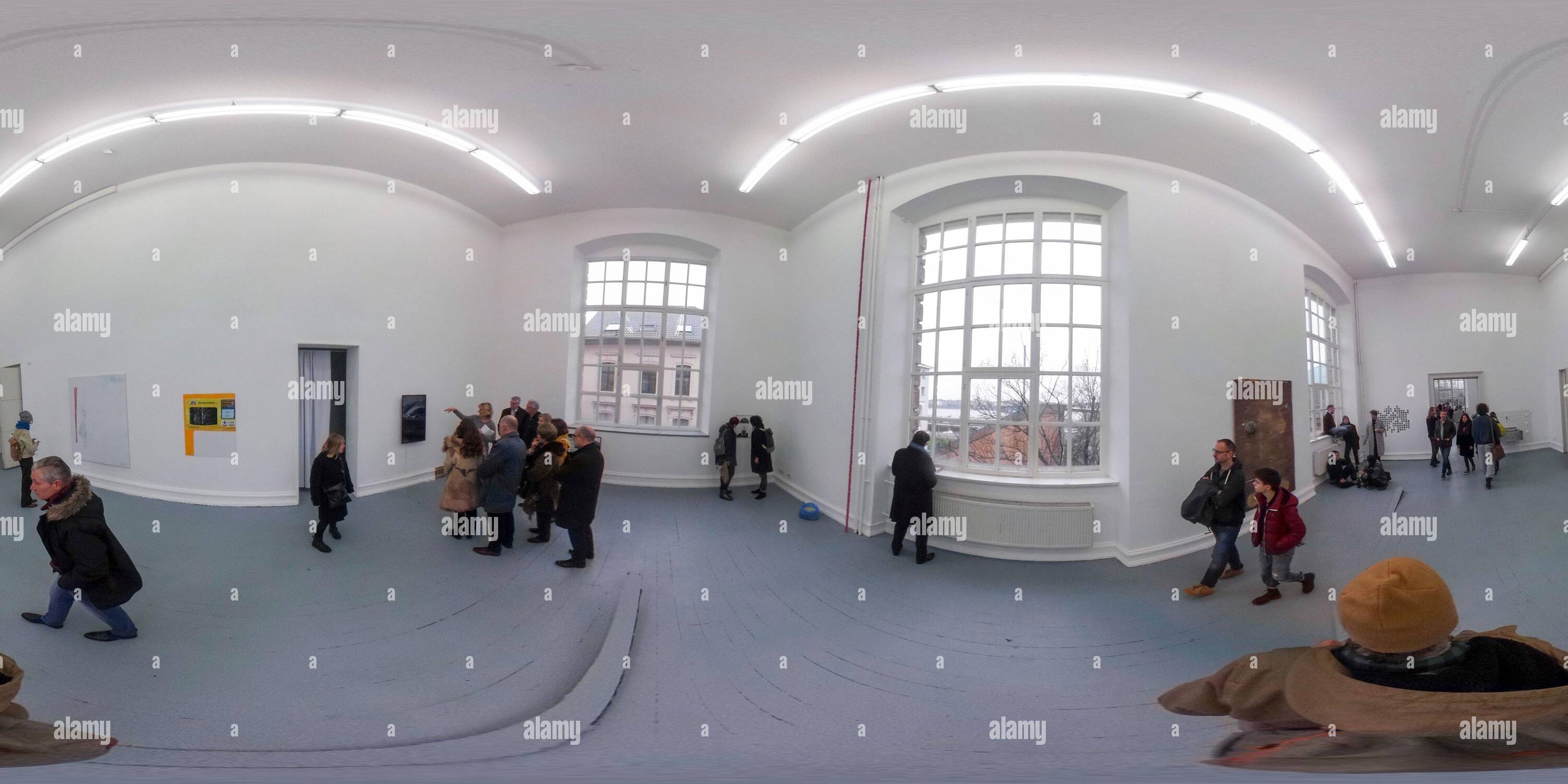 360° view of Visitors looking at student’s work mounted in the ...