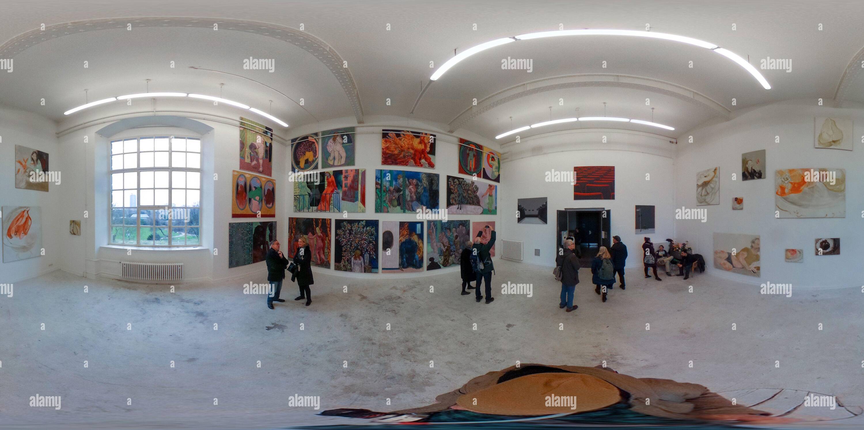 360° view of Visitors looking at student’s work mounted in the ...