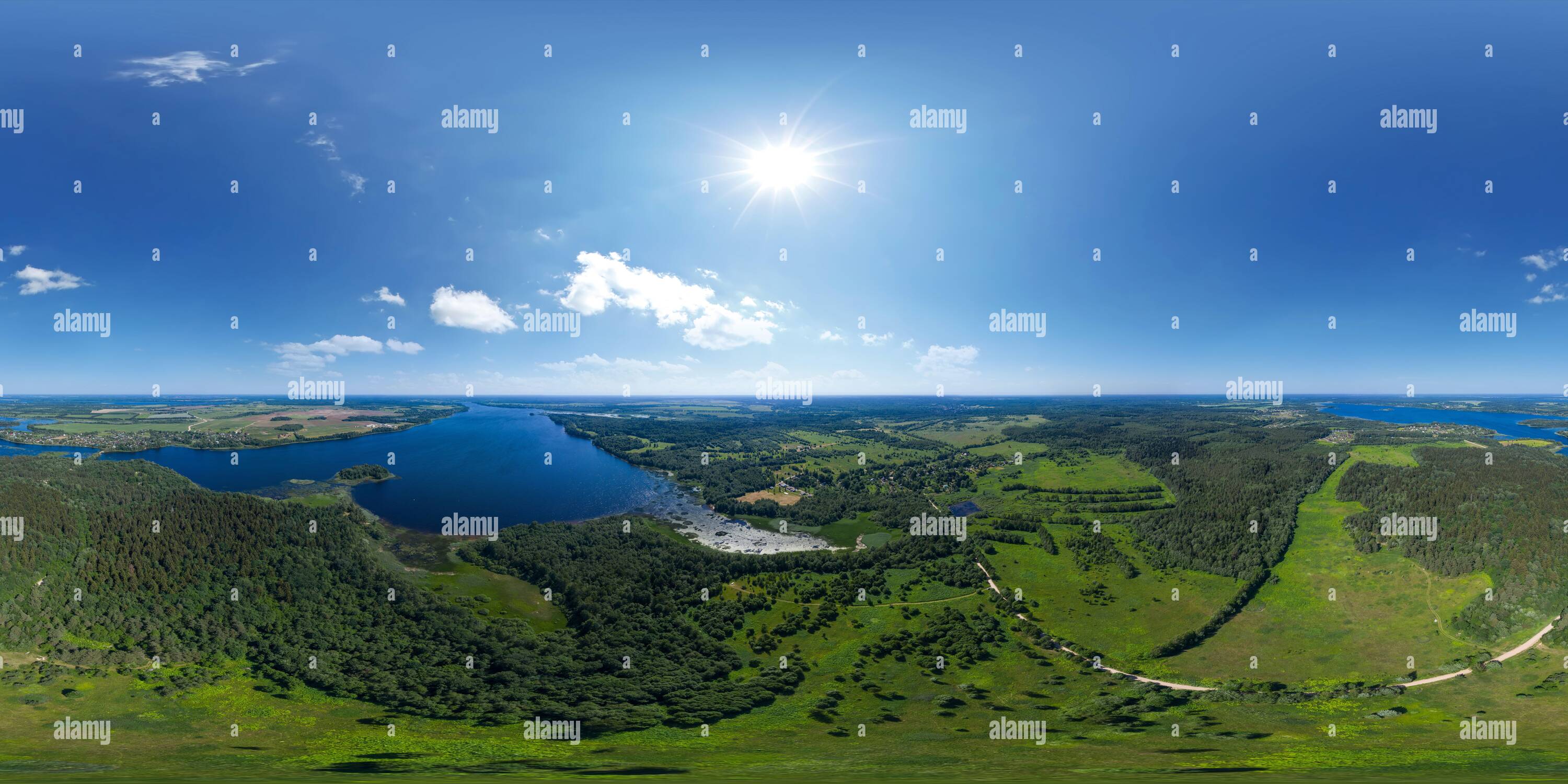360° view of 360-degree panoramic aerial view of the forest and lake in ...