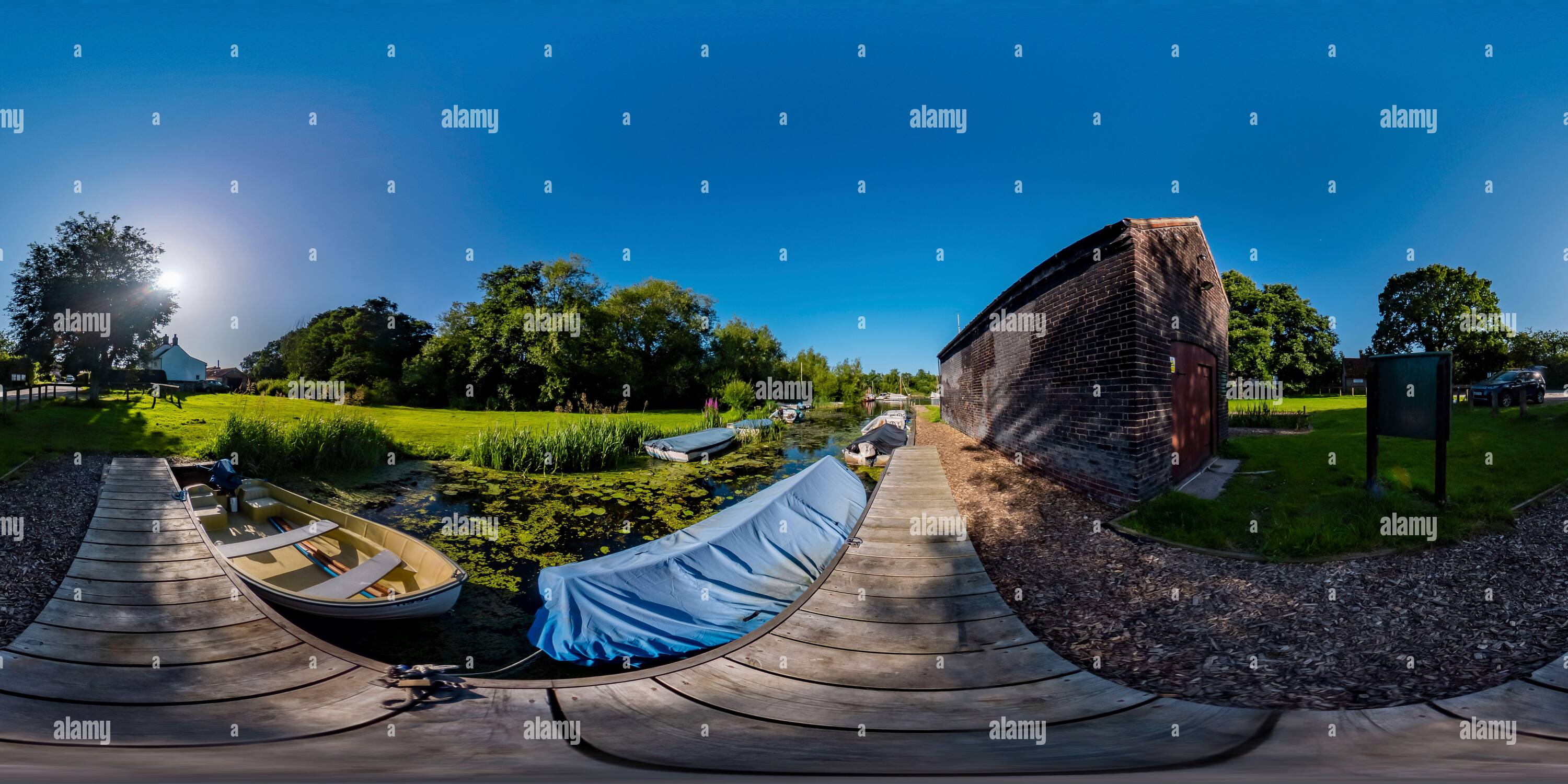 360° view of Barton Turf Staithe on a bright and sunny evening - Alamy