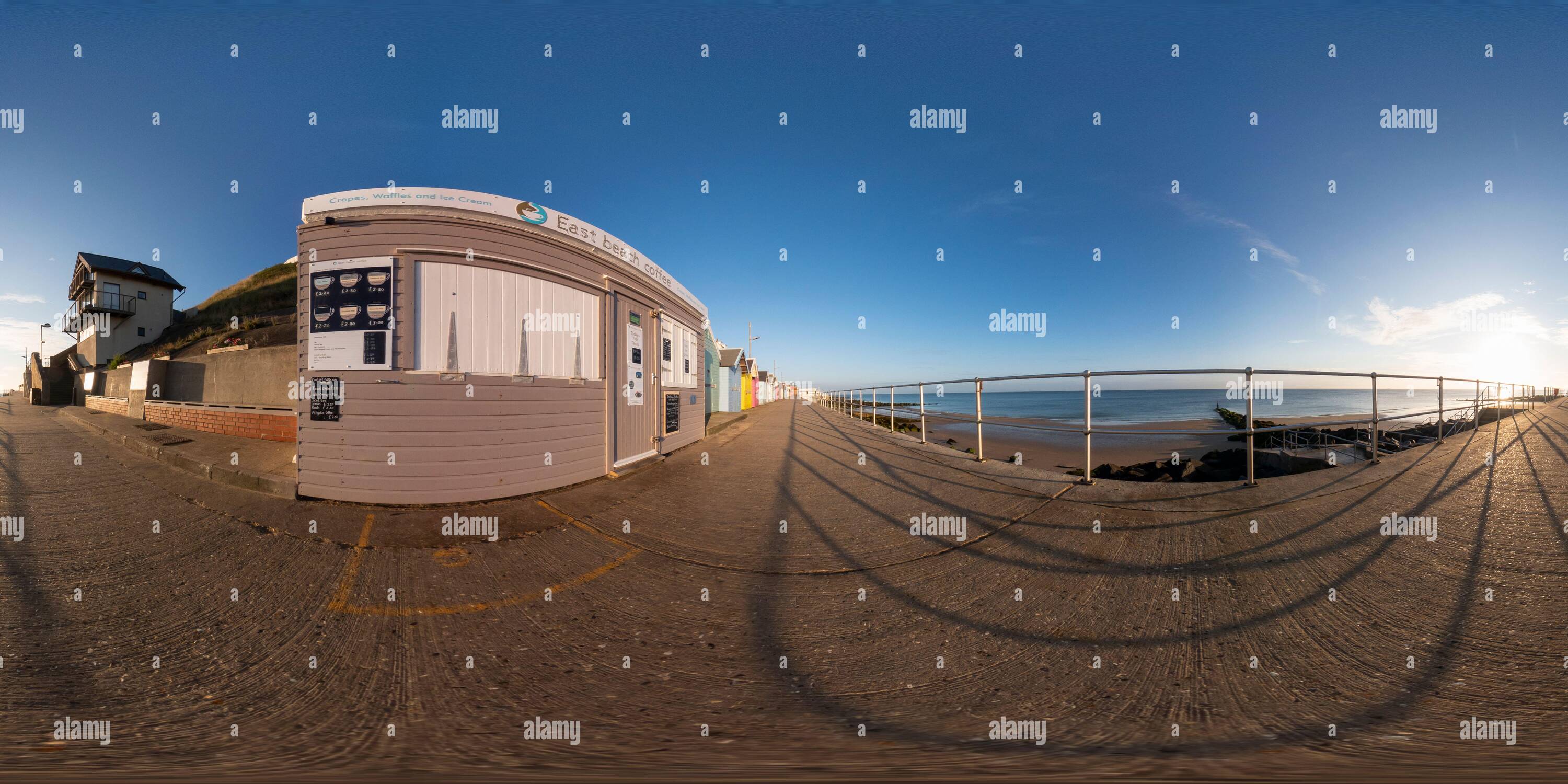 360° view of Sheringham promenade and beach huts early morning just ...