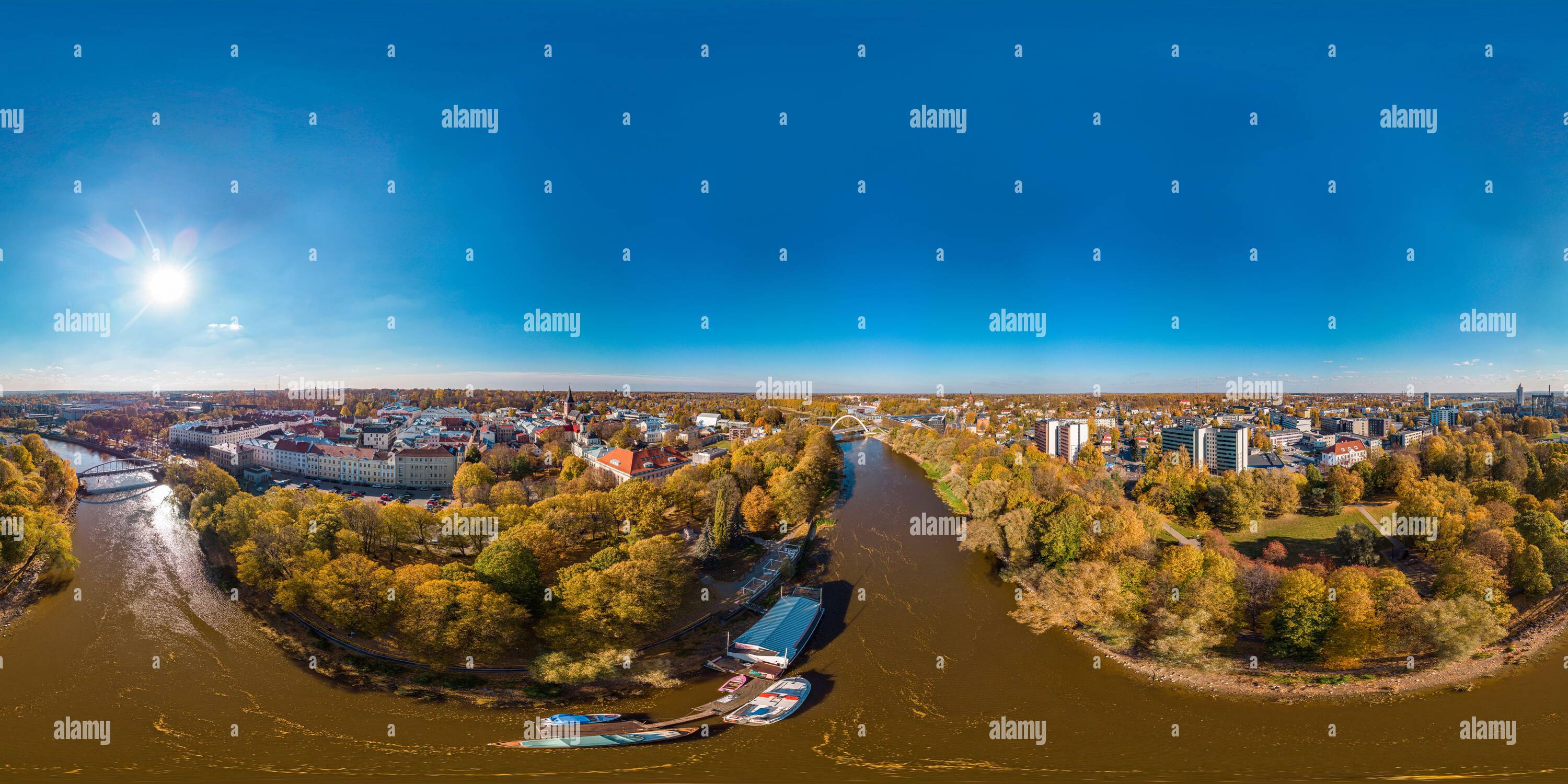 360° view of Autumn riverside park in a city with old town - Alamy