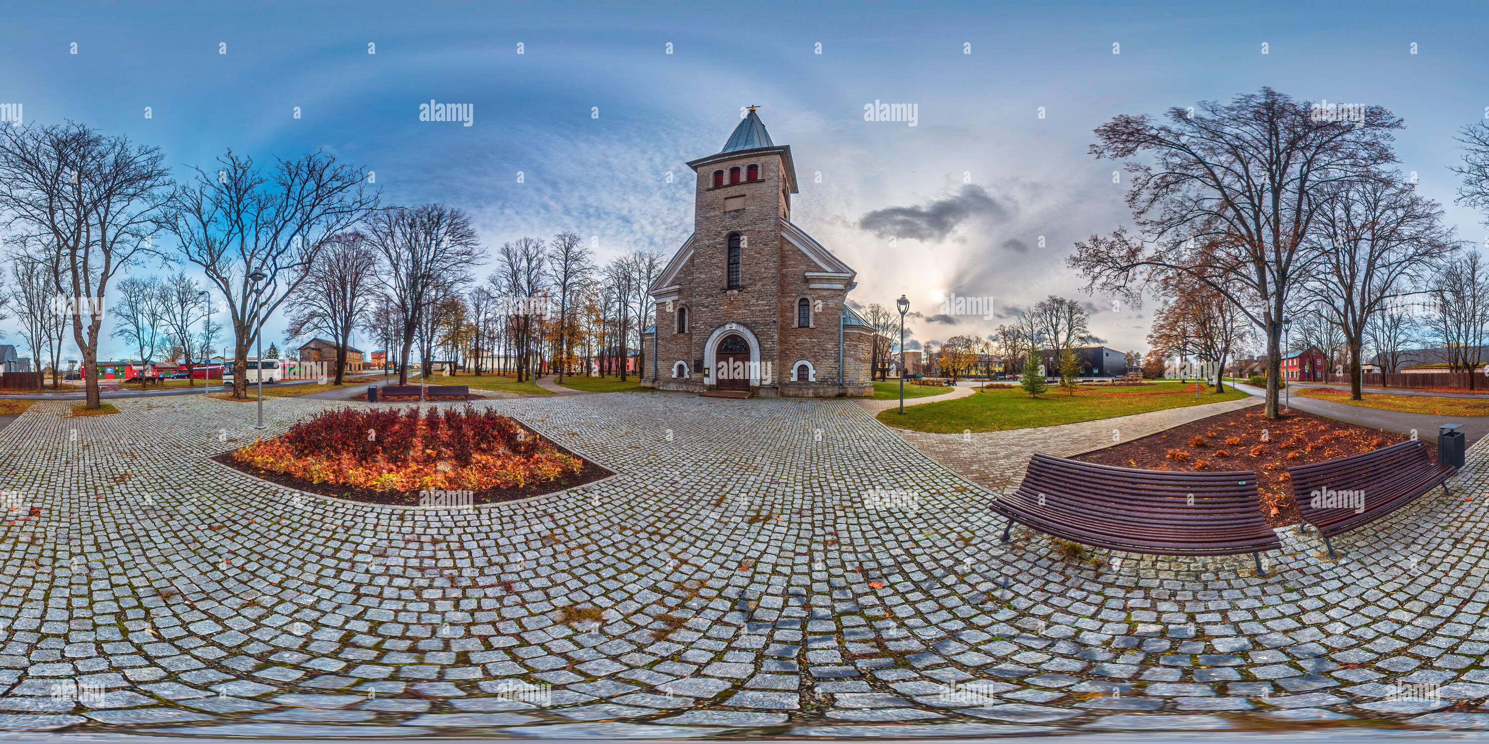 360° view of 360 exterior view of a medieval church building in autumn ...