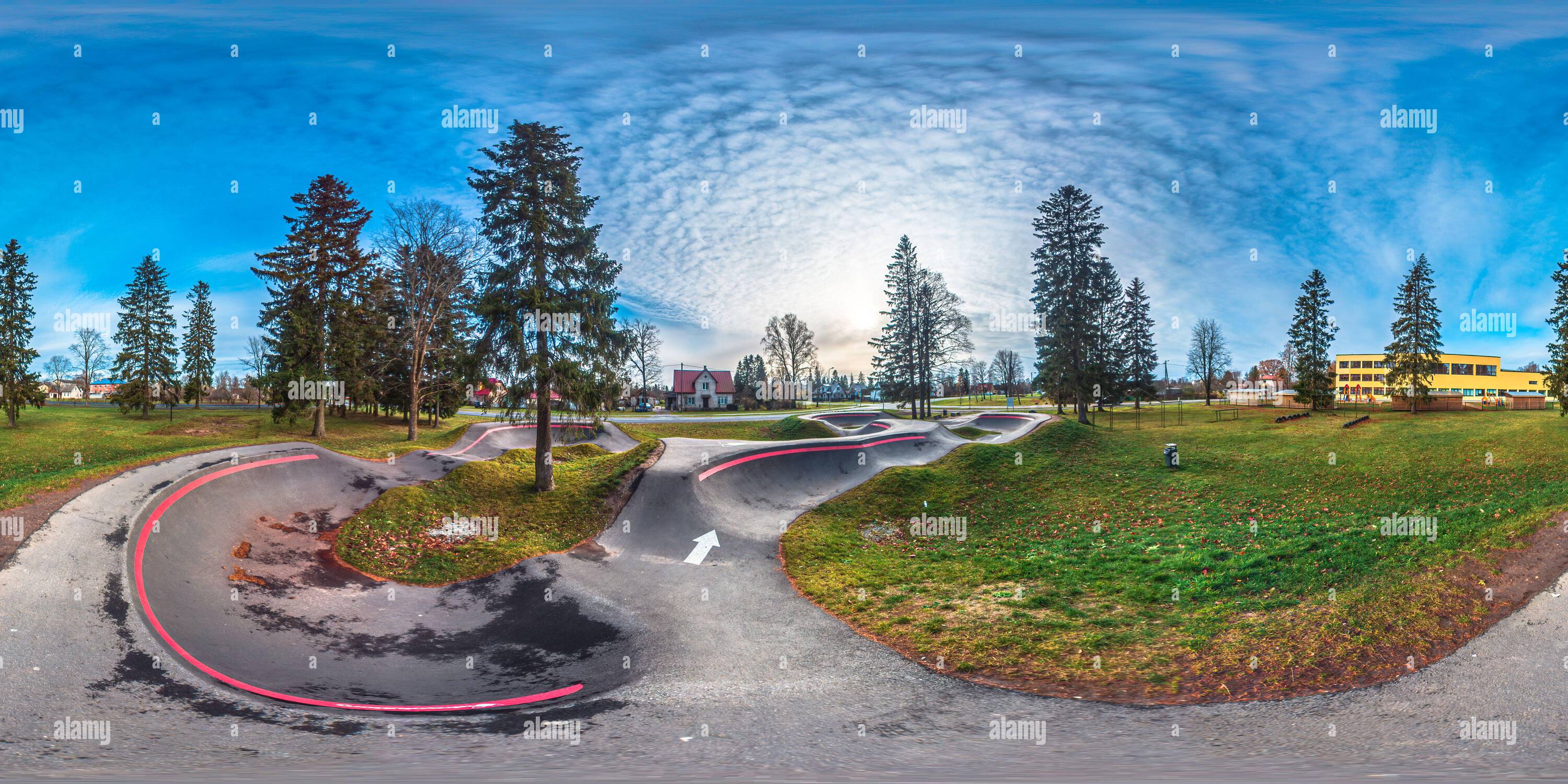 360° view of Bump track for scooters in a small suburban town in autumn ...