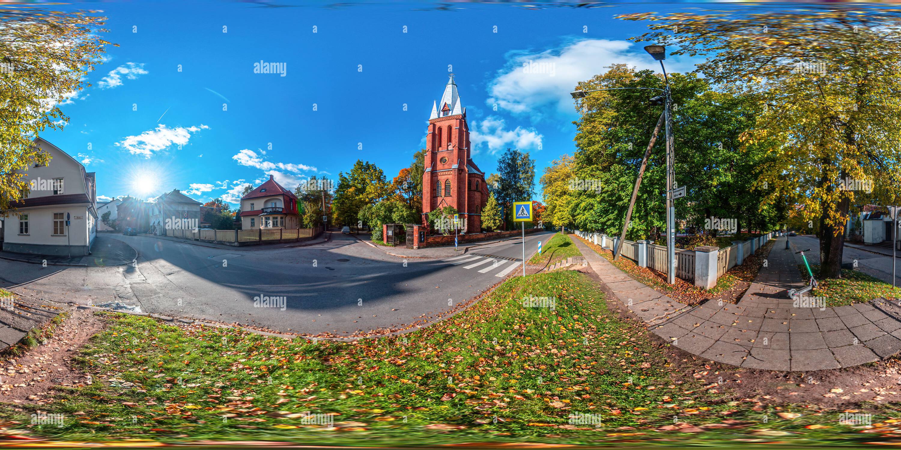 360° view of 360 view of an autumn street with fallen leaves, sunshine ...