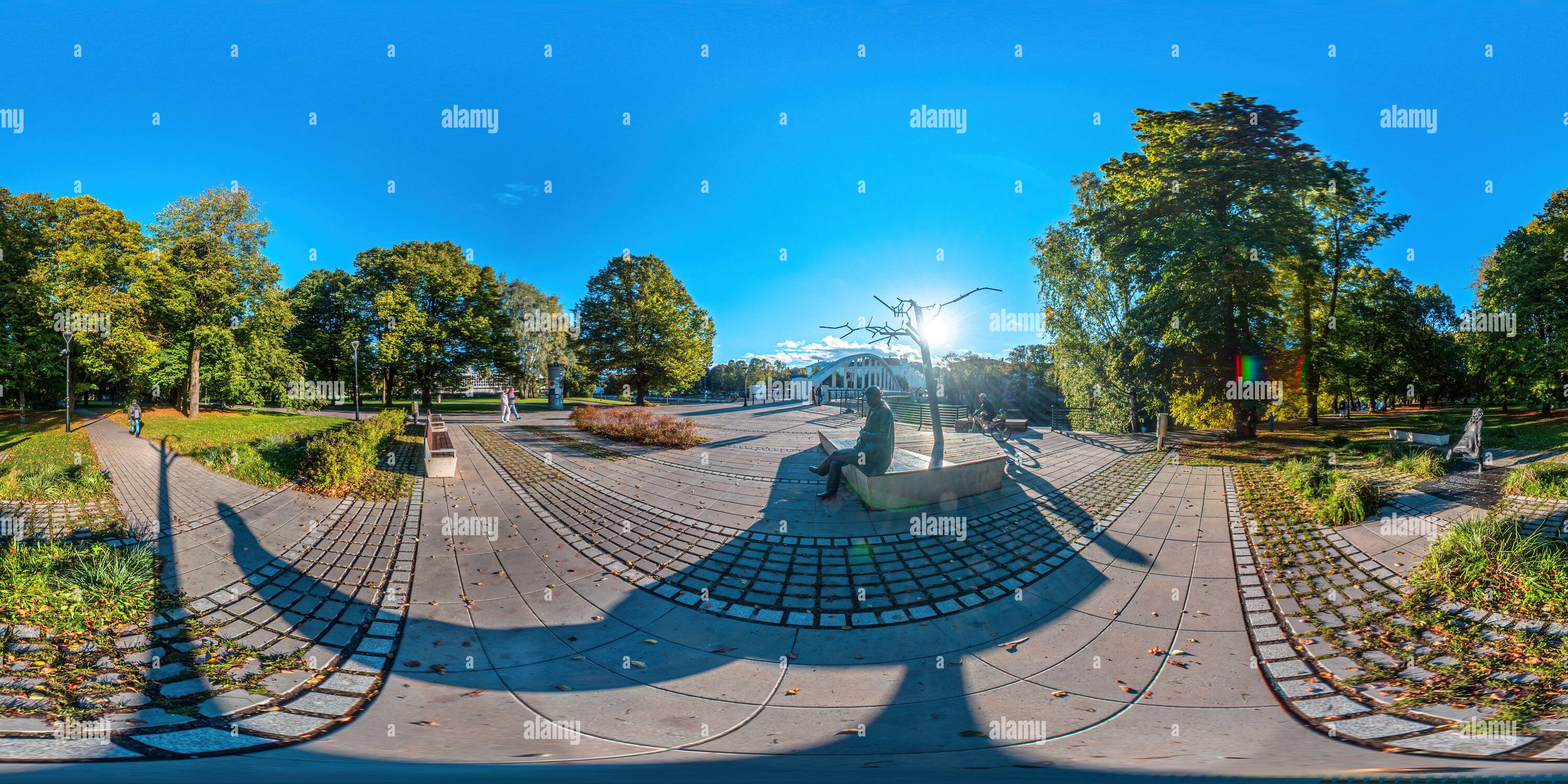 360° view of A sunny riverside autumn park with fallen leaves and ...