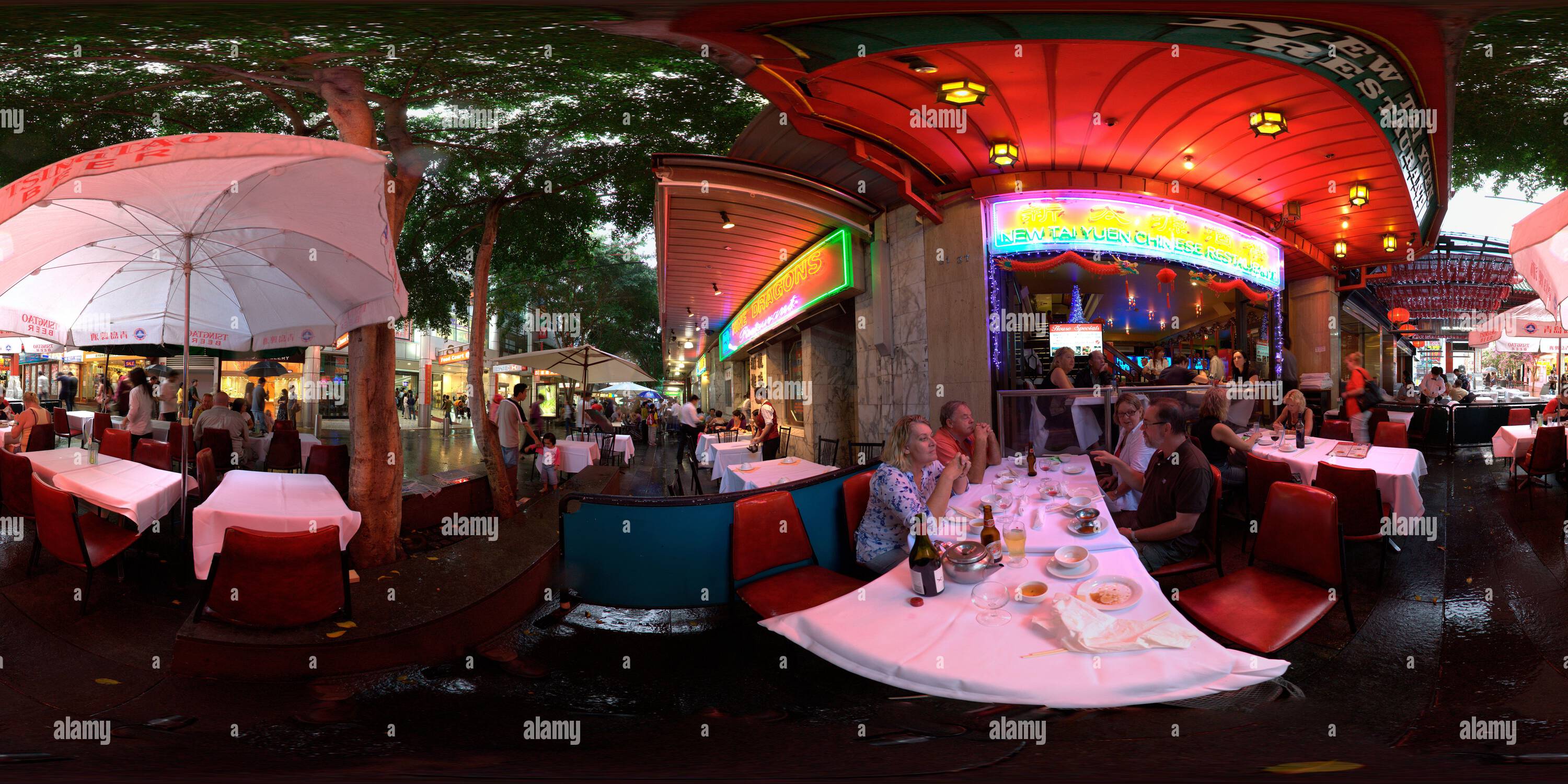 360° view of A vibrant outdoor restaurant scene with patrons enjoying ...