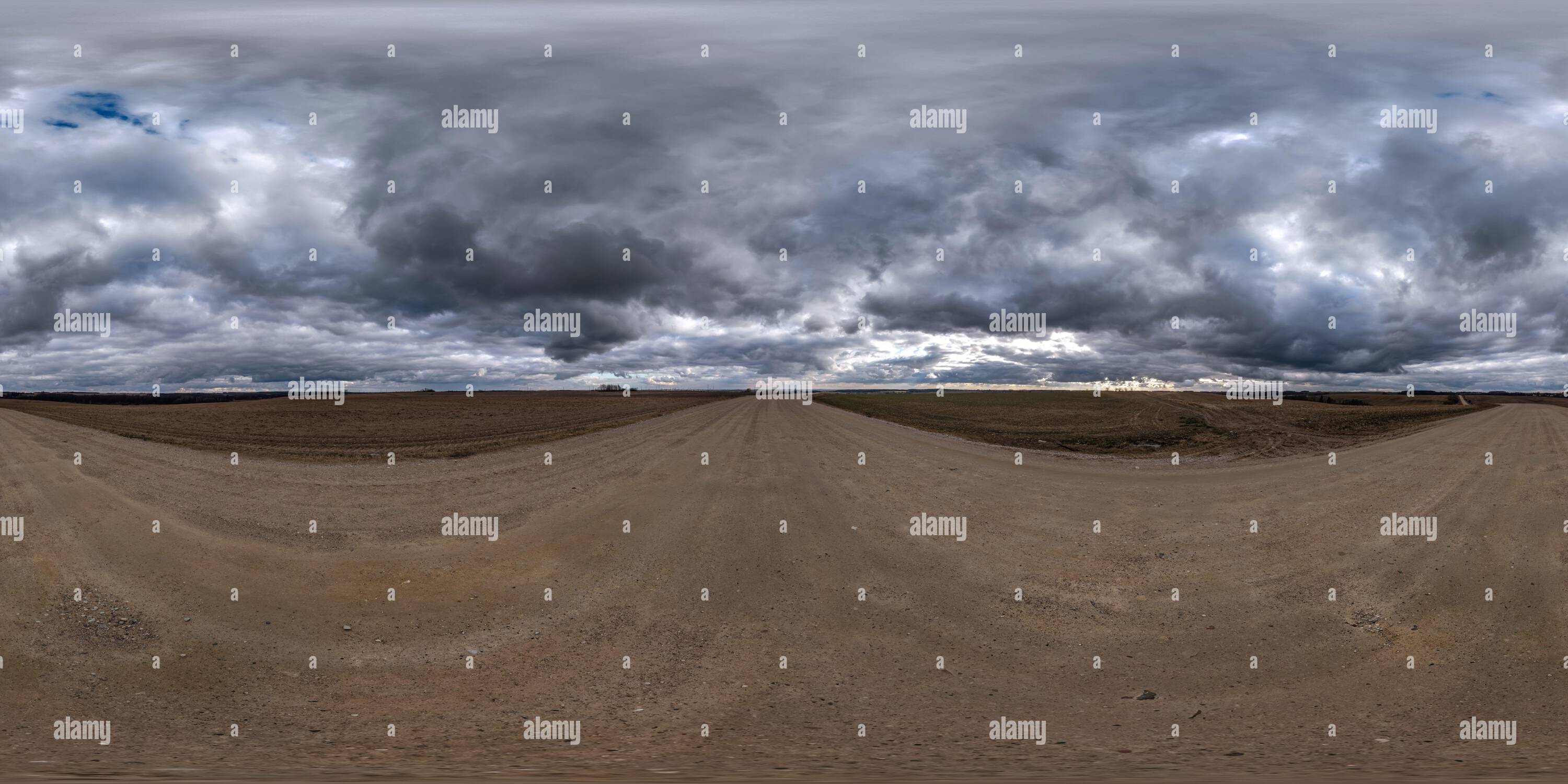 360° view of 360 seamless hdr panorama view on gravel road with clouds ...