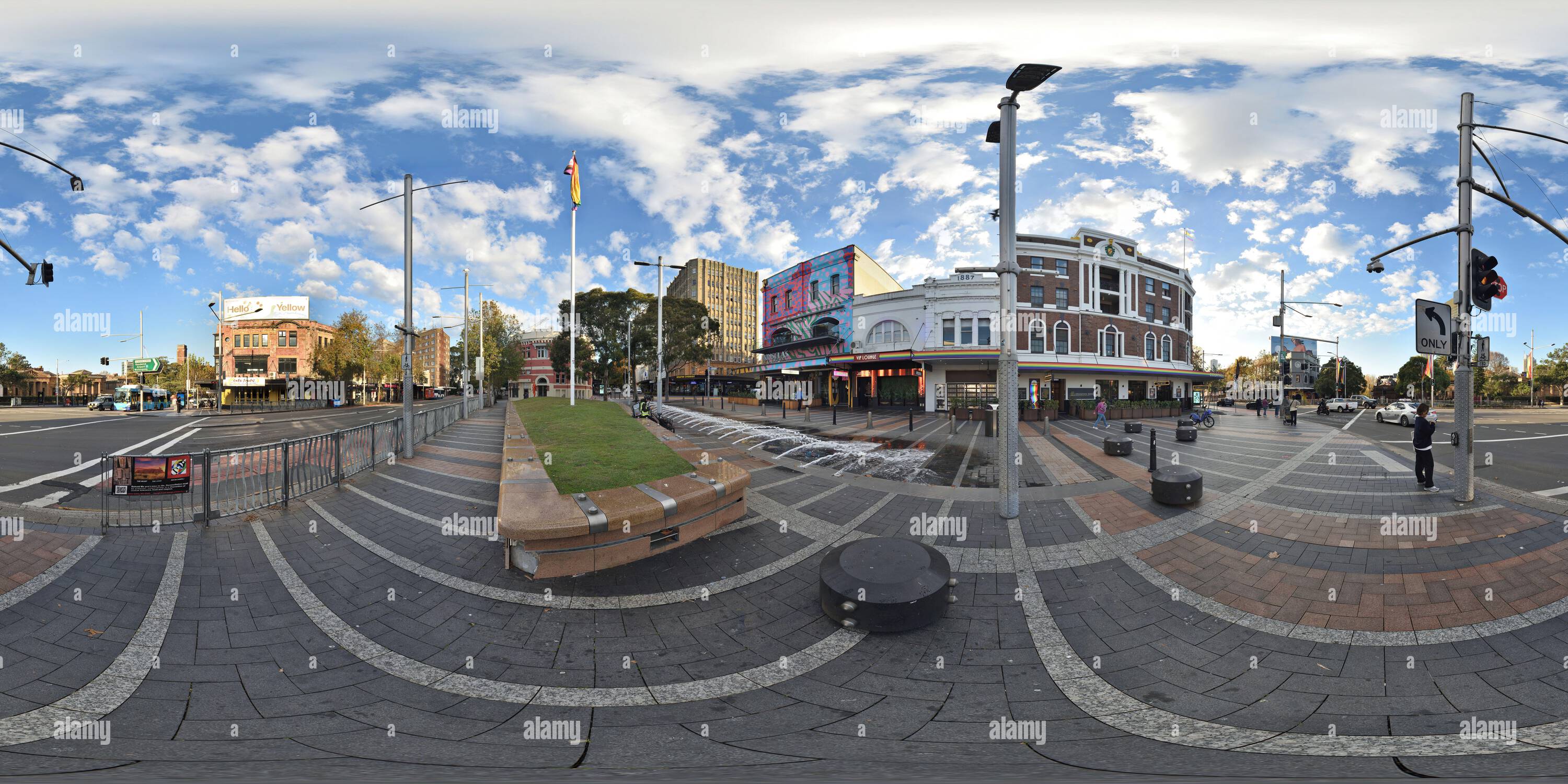 360° view of Late aftenoon at Taylor Square, traffic, pubs, and running ...