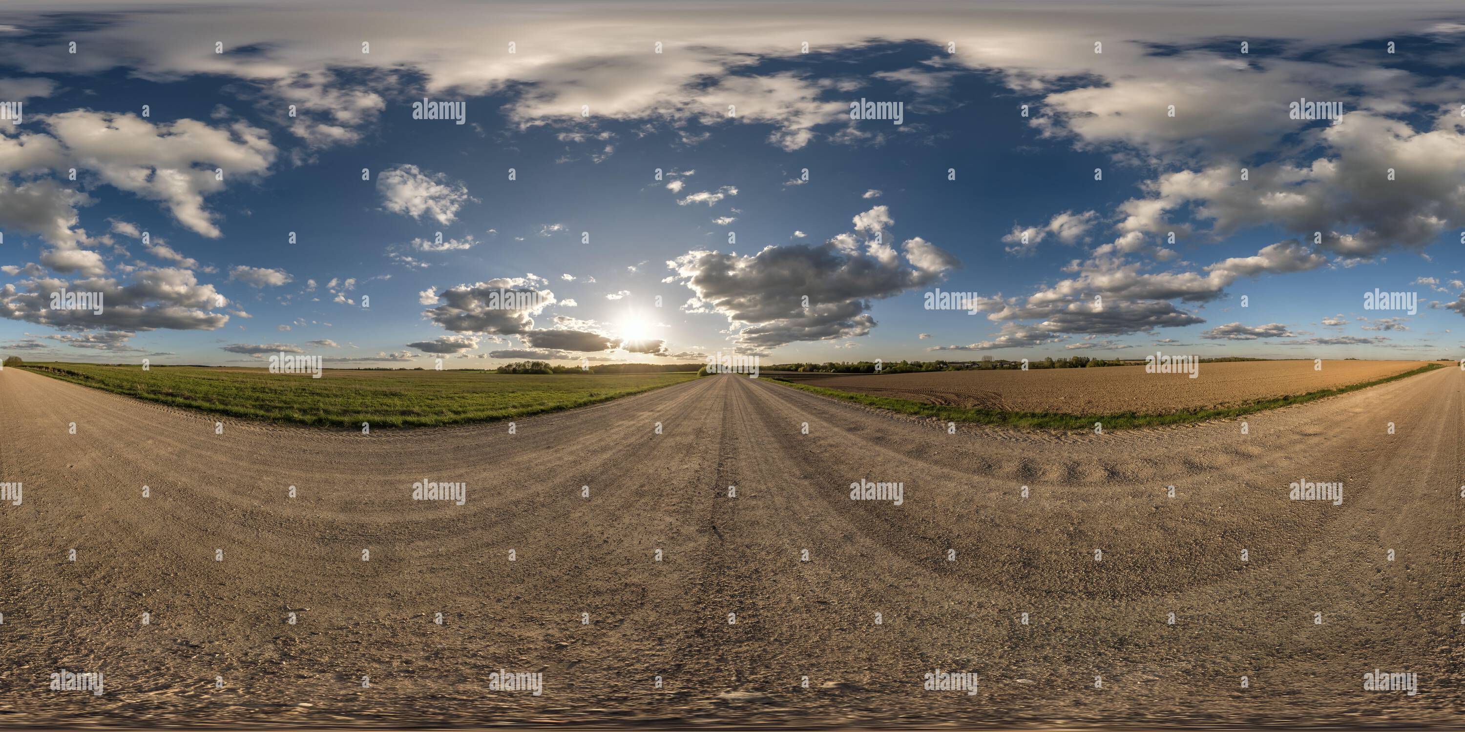 360° view of 360 hdri panorama near asphalt road with evening clouds on ...