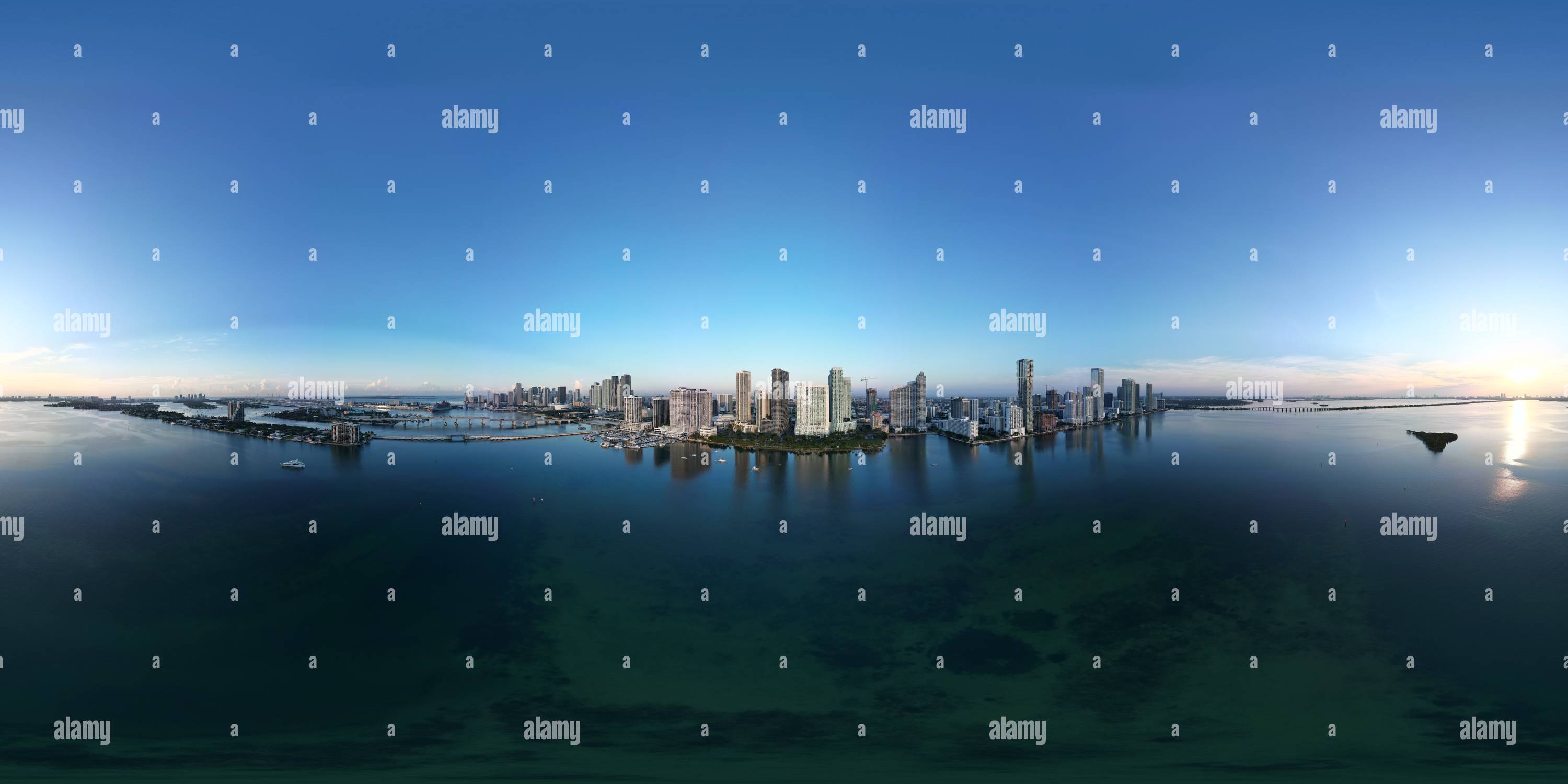 360° view of Dawn over Miami over the waterway - Alamy