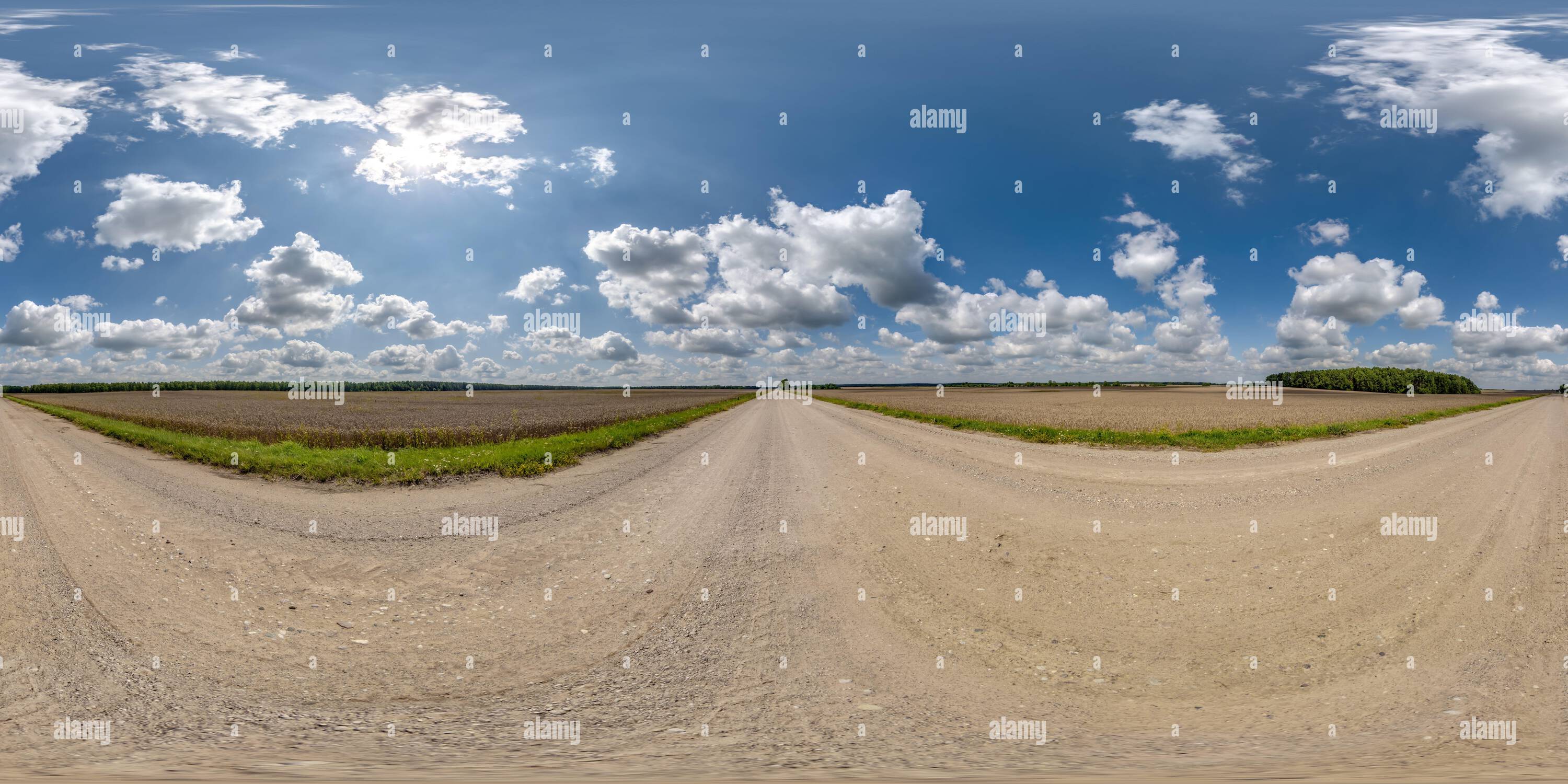 360° view of 360 hdri panorama on wet gravel road with marks from car ...