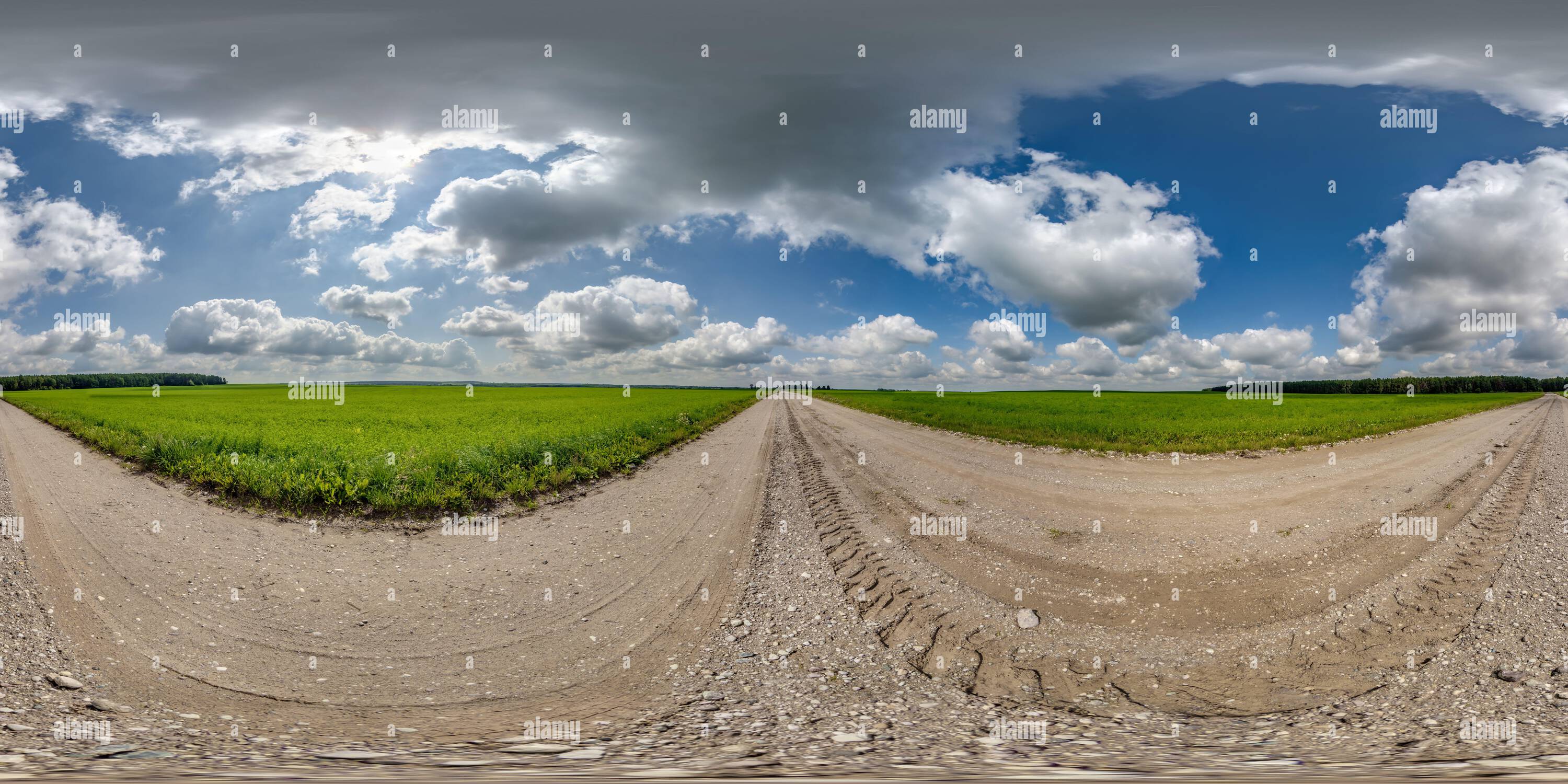 360° view of 360 hdri panorama on gravel road with marks from car or ...