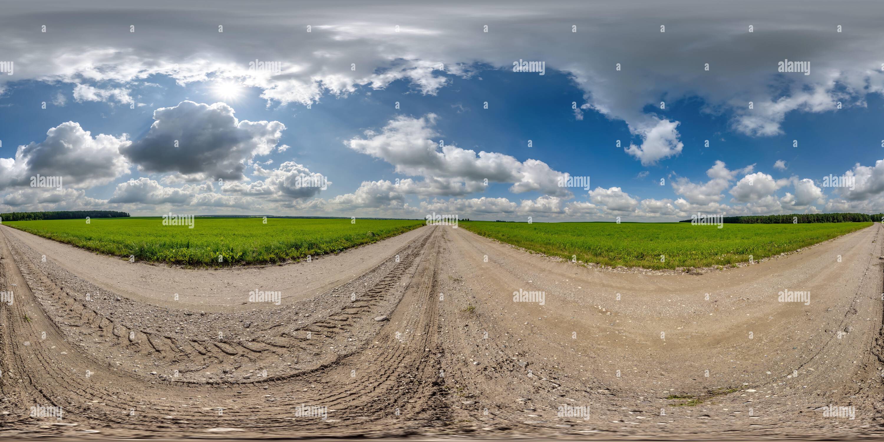360° view of 360 hdri panorama on gravel road with marks from car or ...