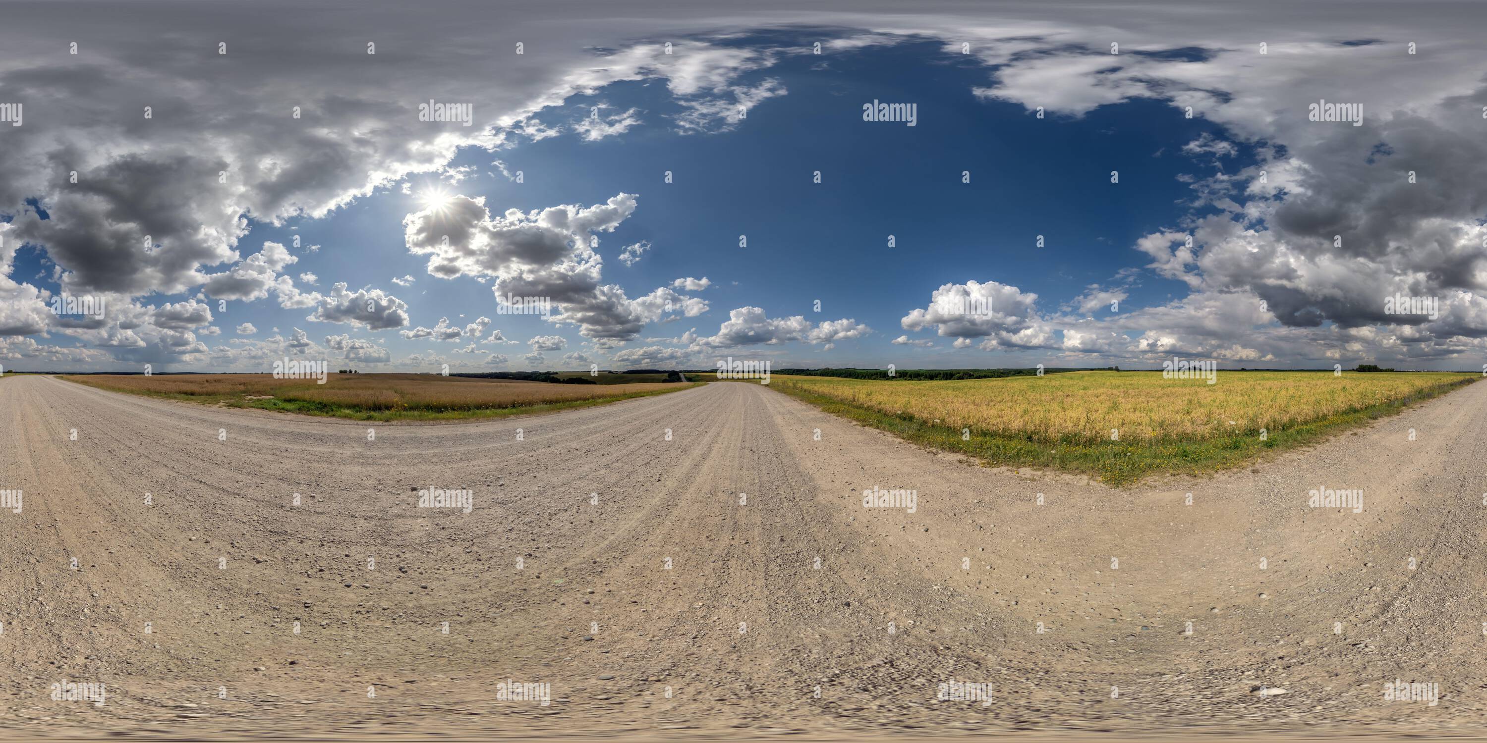 360° view of 360 hdri panorama on gravel road with marks from car or ...