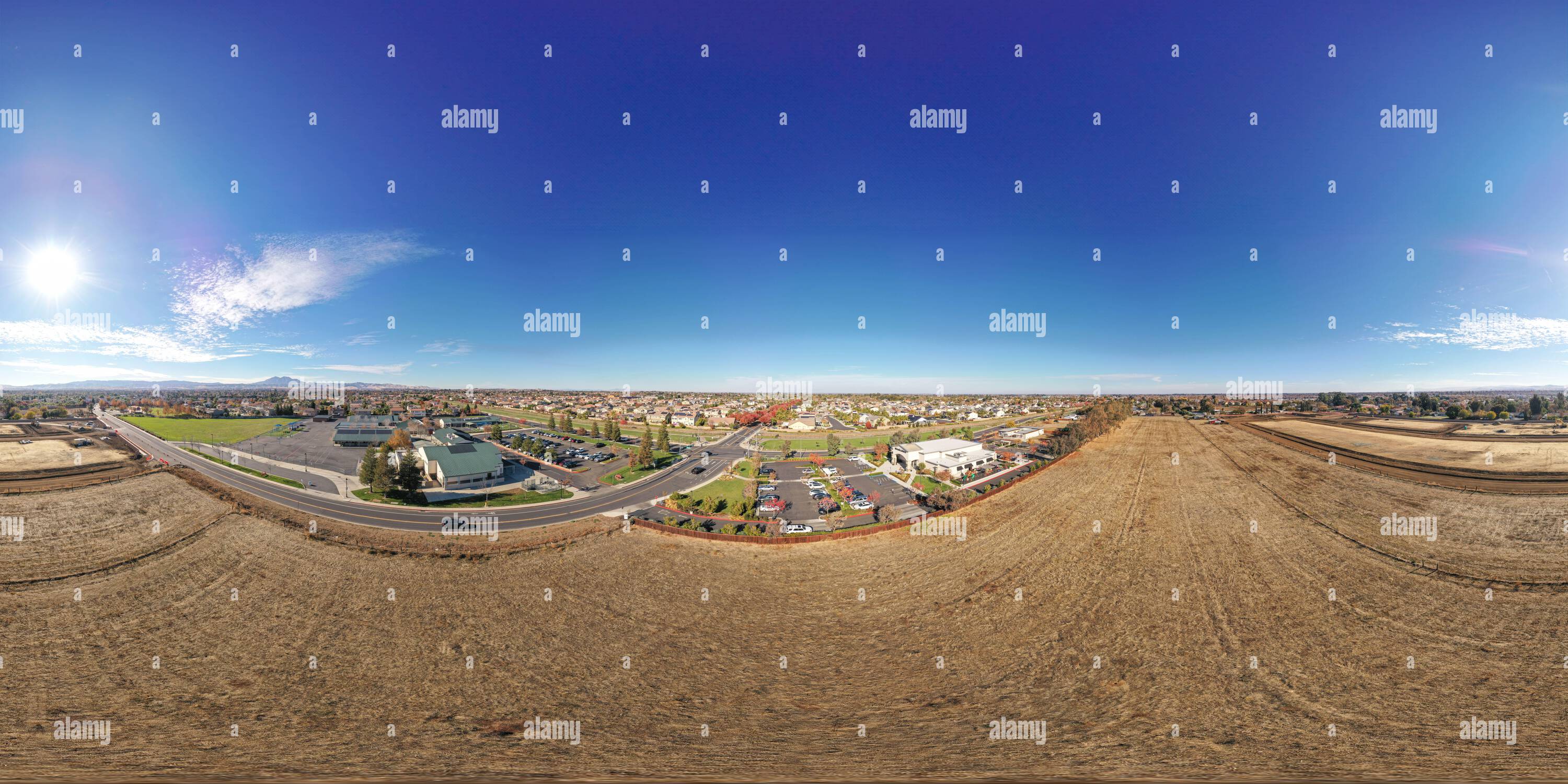 360° view of Aerial 360° drone panorama over a residential neighborhood ...