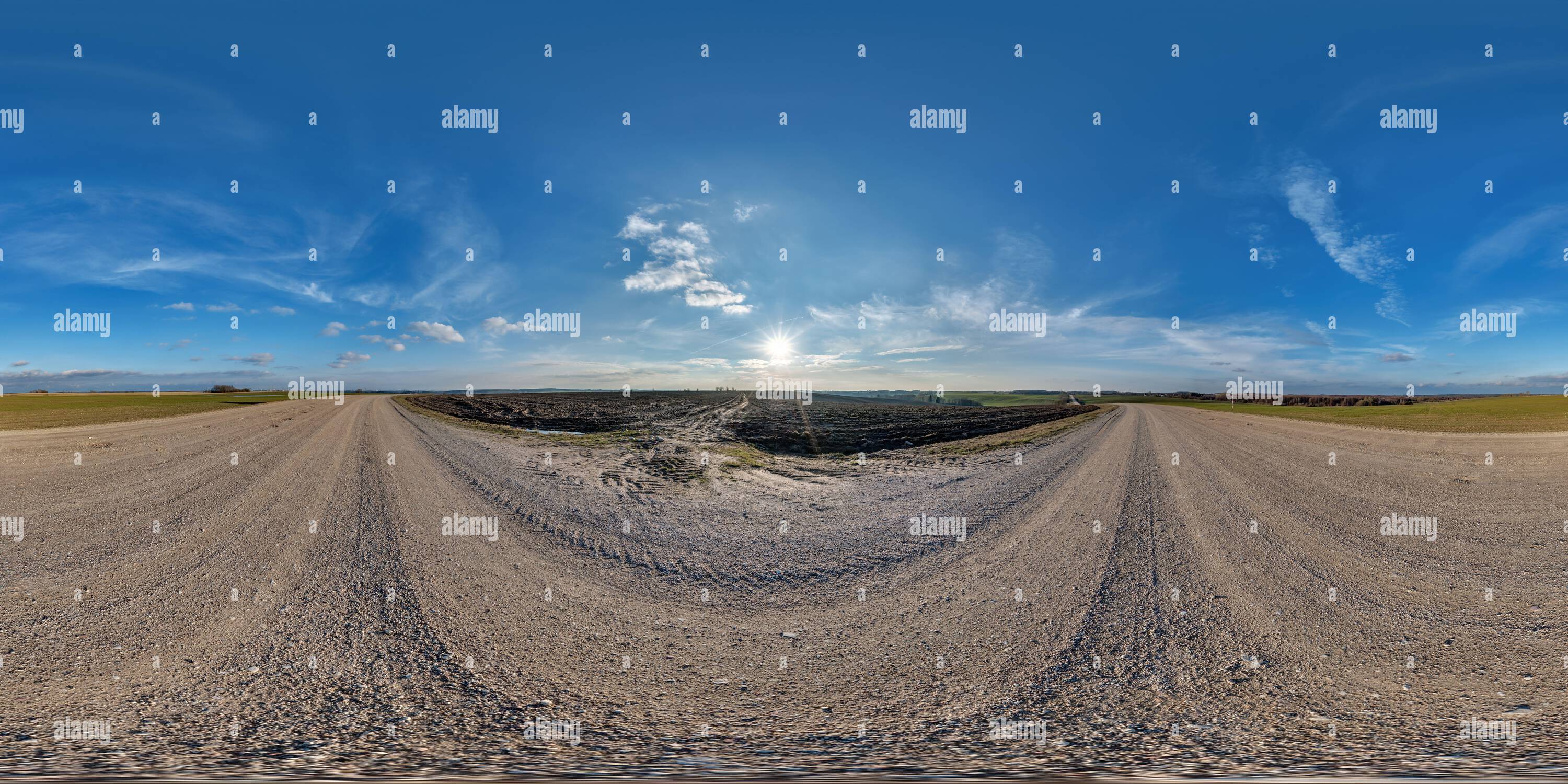 360° view of hdri 360 panorama on gravel road among fields in spring ...