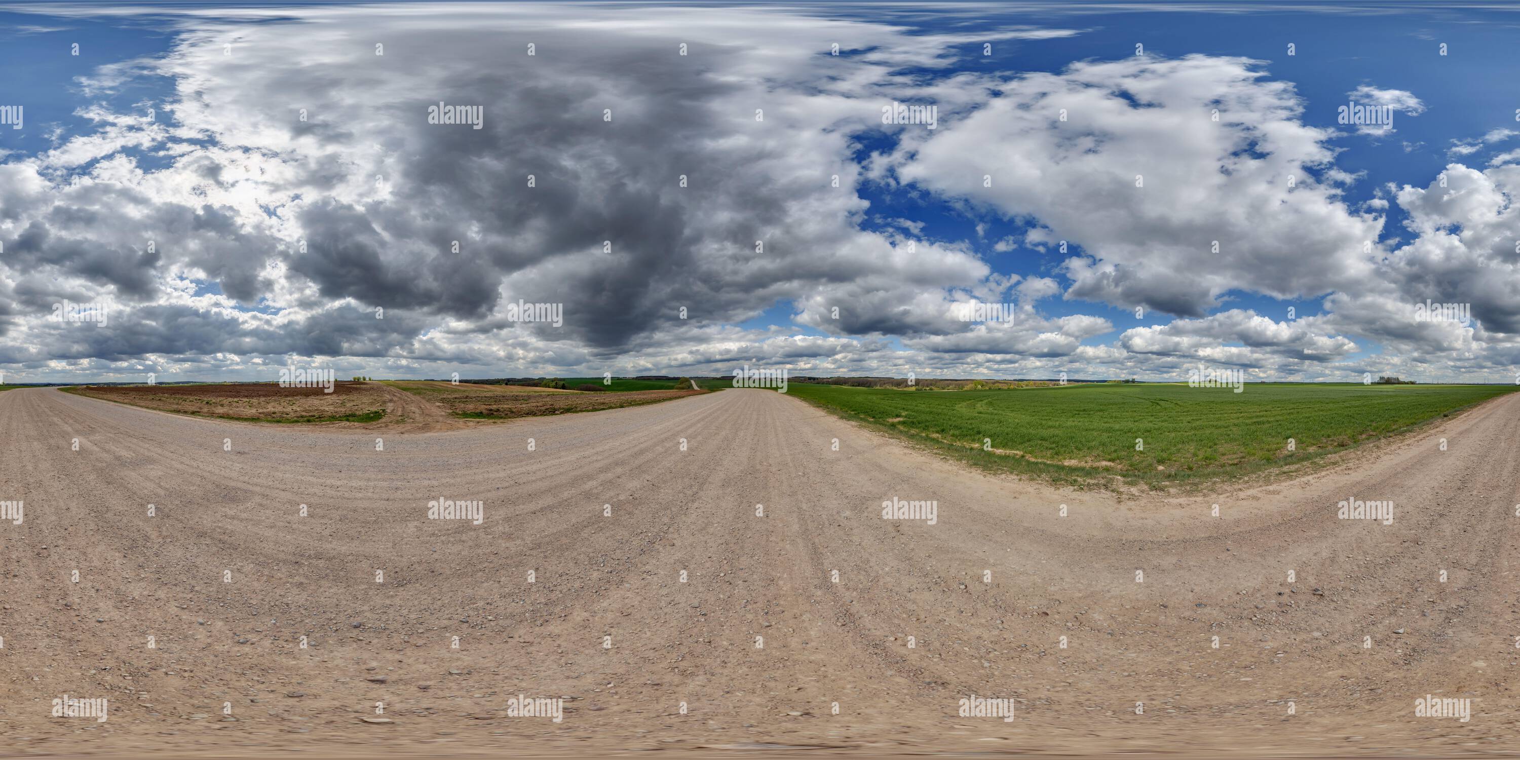 360° view of hdri 360 panorama on wet gravel road among fields in ...