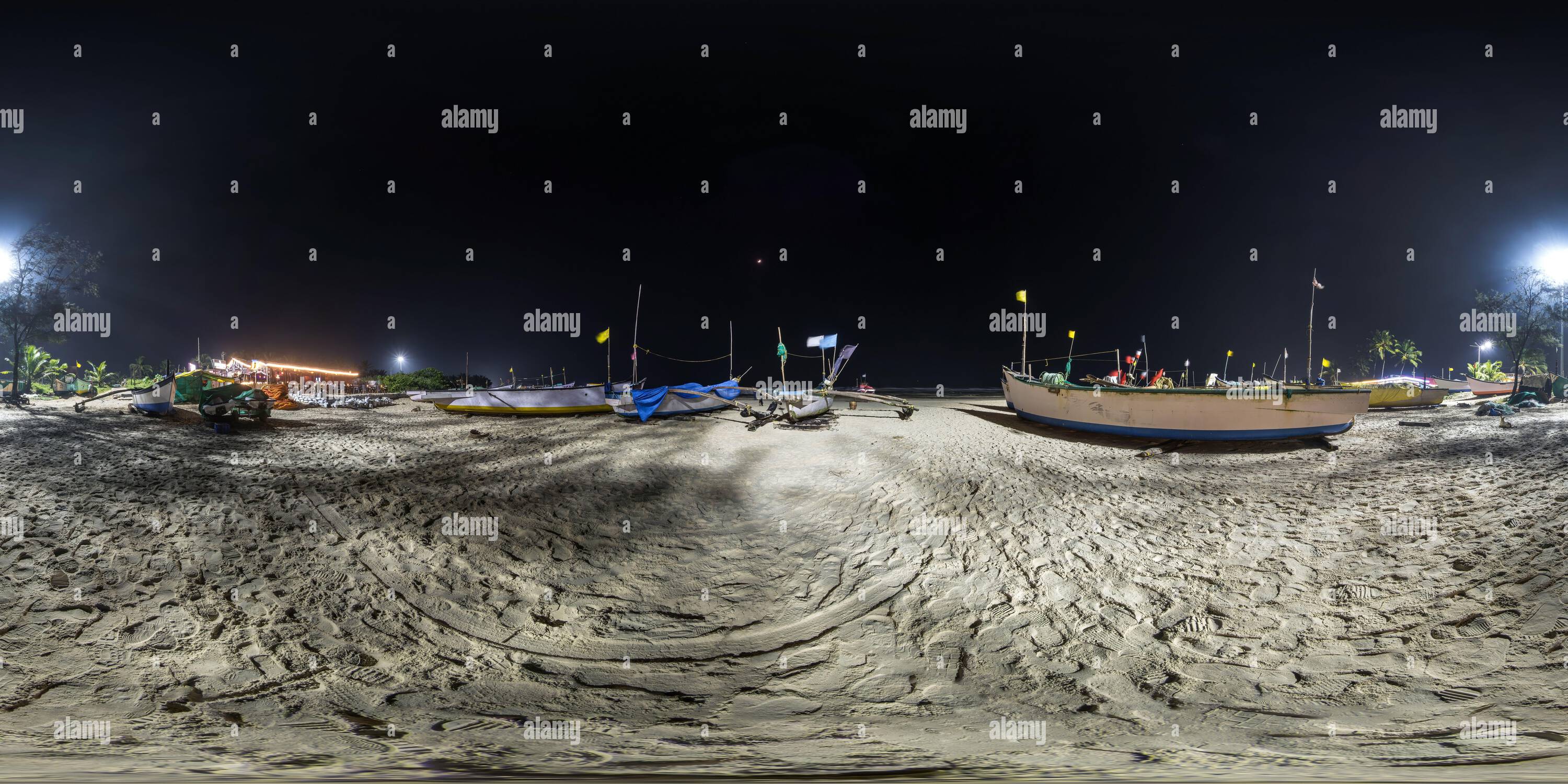 360° view of 360 night panorama near old fishing boats in the sand on ...