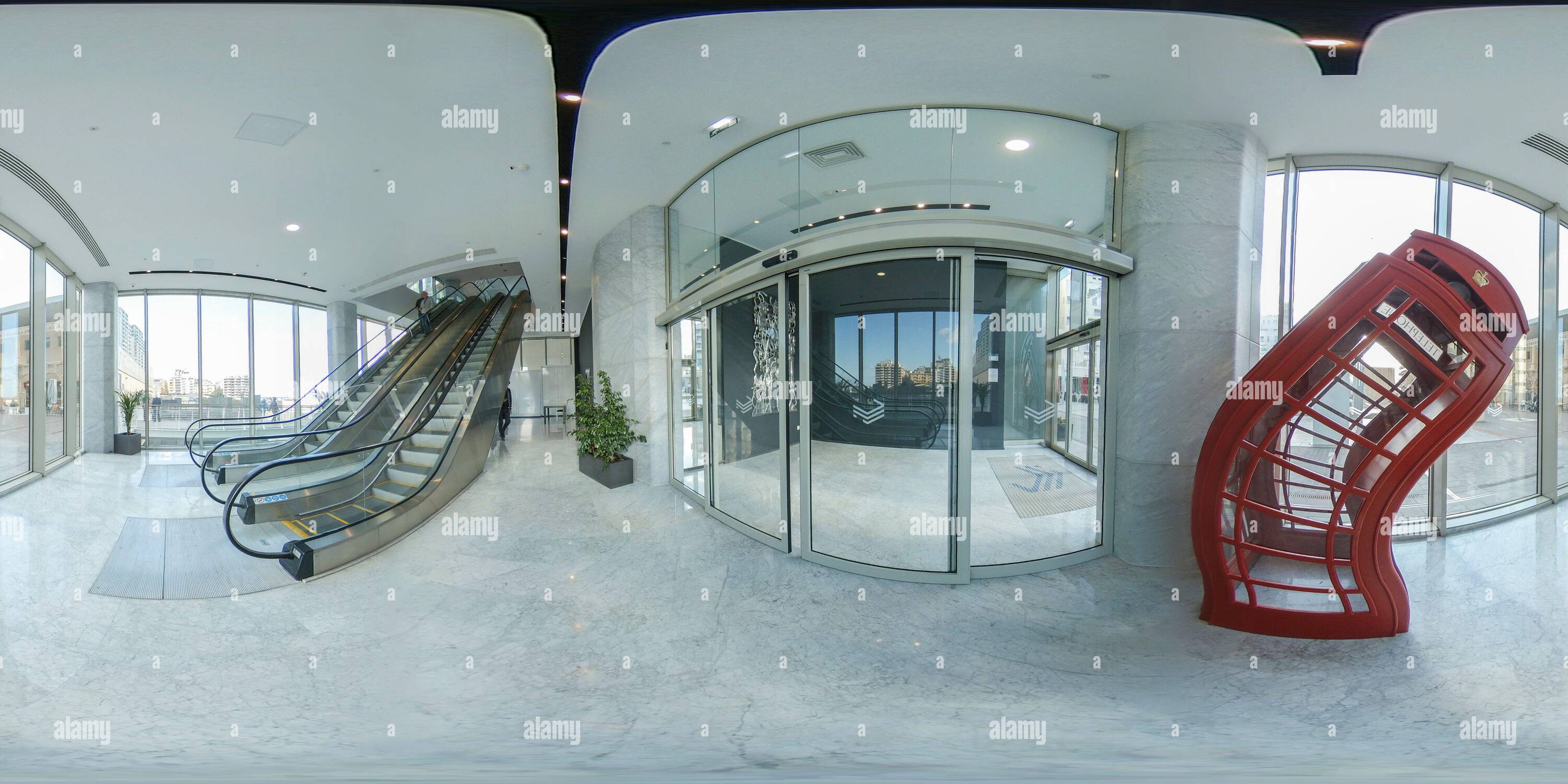 360° view of Modern Office Building Interior with Escalators and Red ...