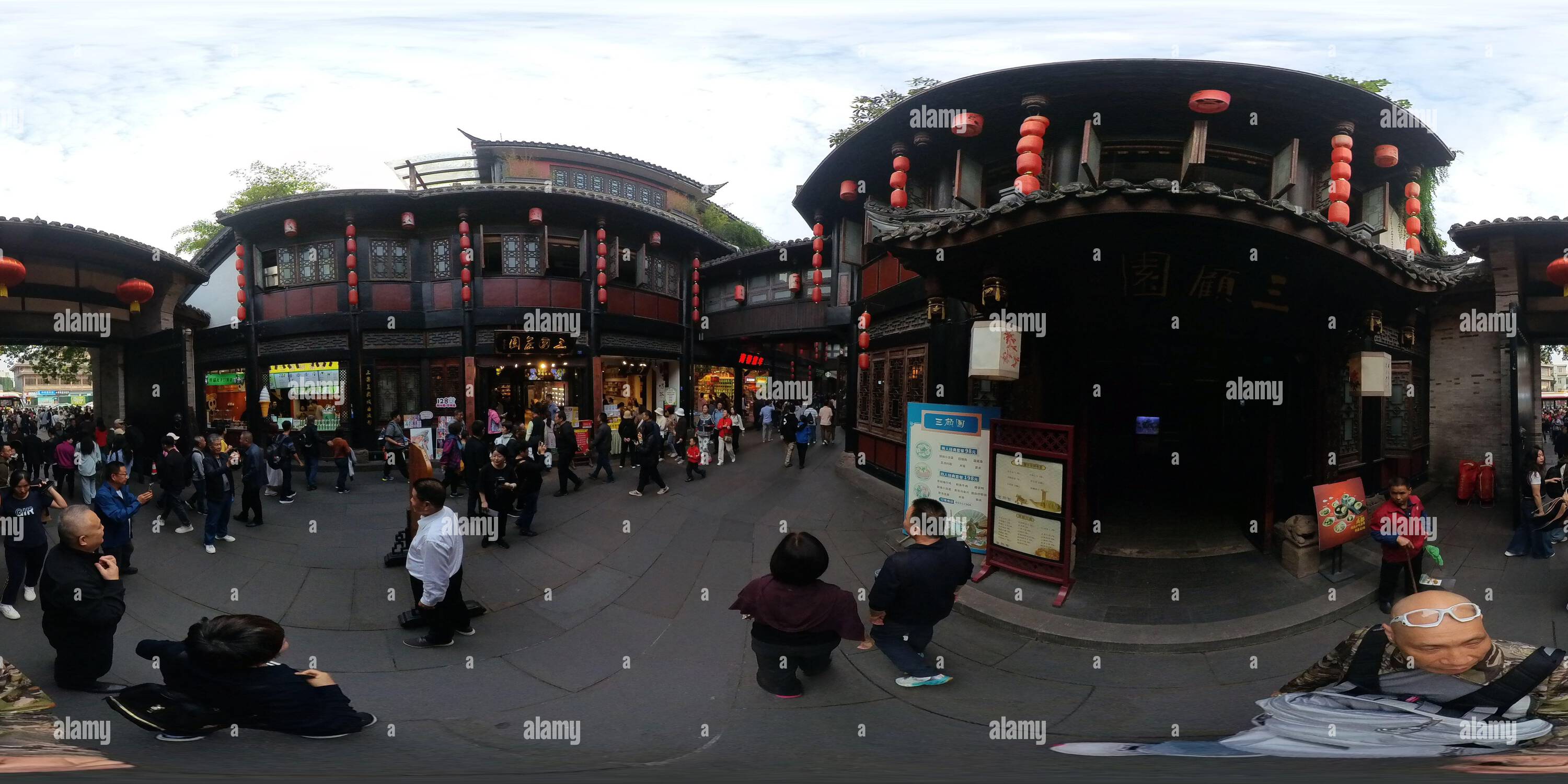 360° view of 360 view of tourists and locals visiting the local shopping mall and walking ...