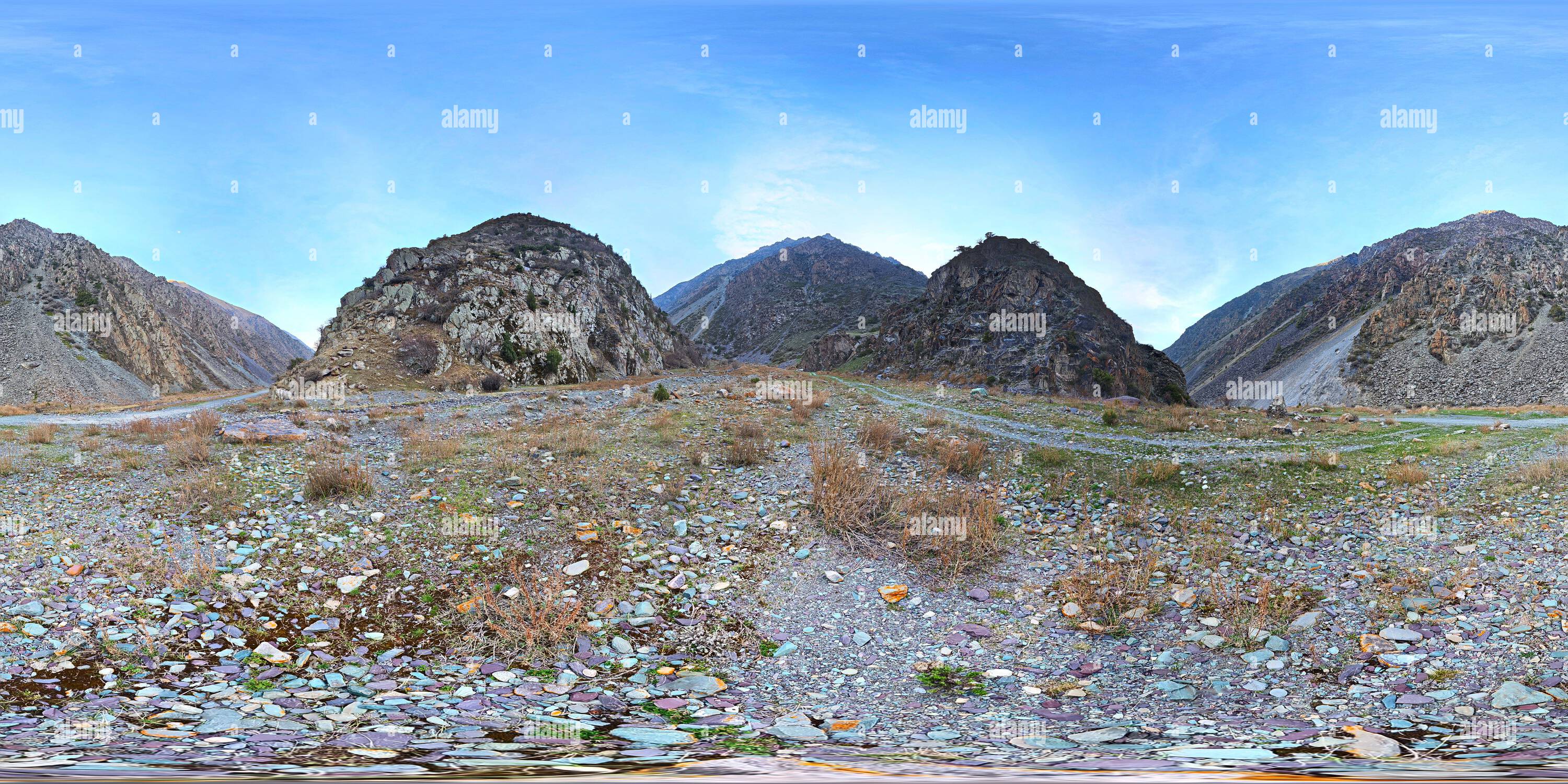 360° view of Full Spherical panorama of dry rocky riverbed in mountain ...