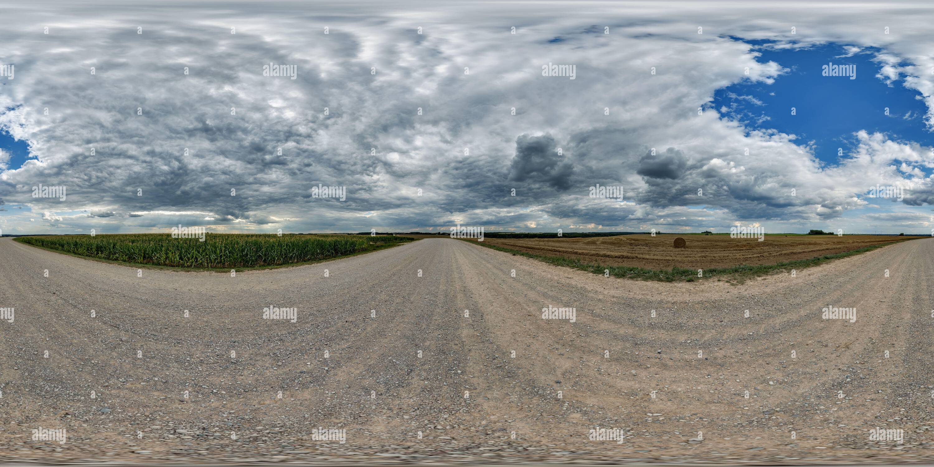 360° view of 360 hdri panorama on roadside of gravel road with rain ...