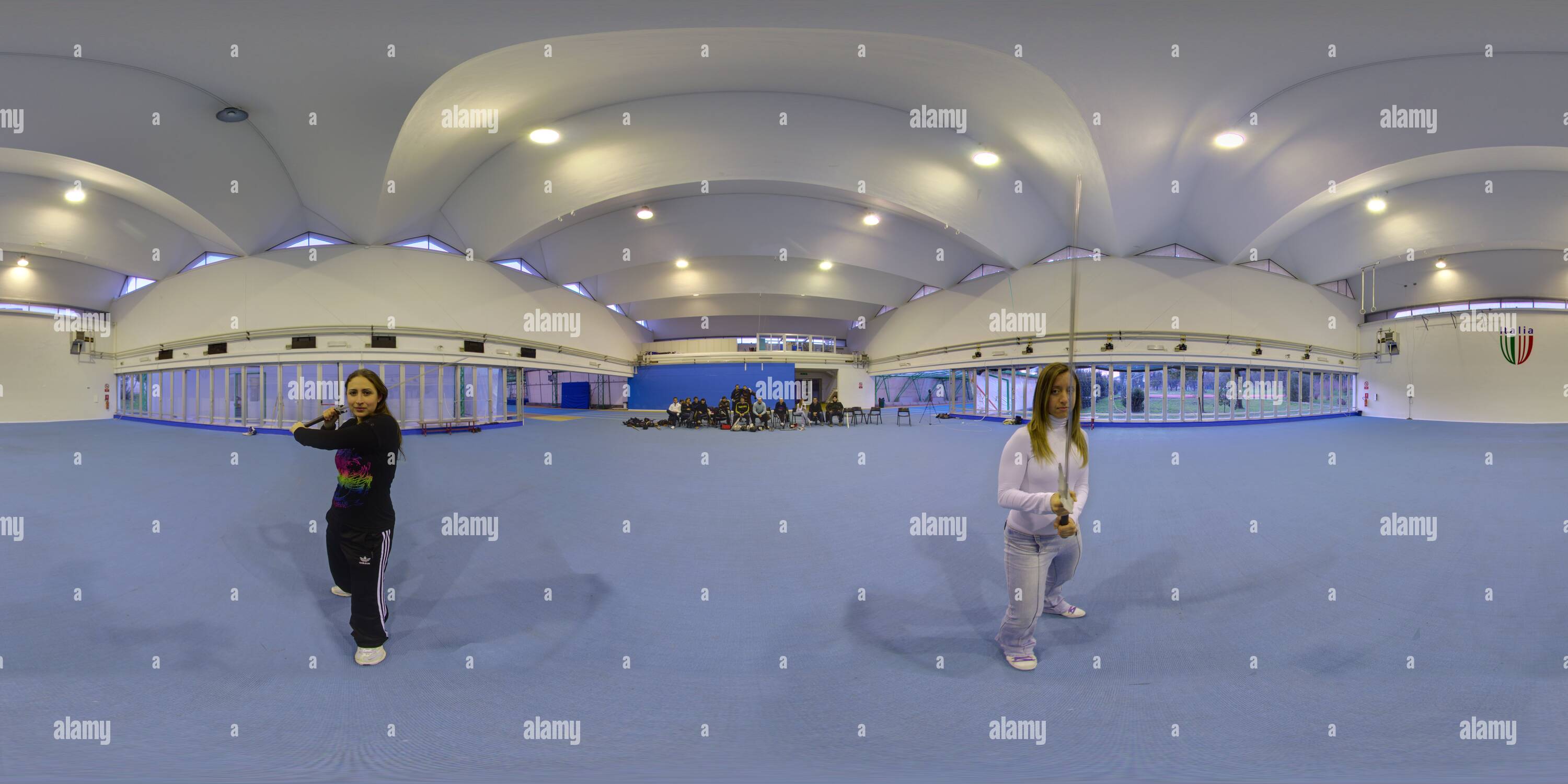 360° view of Two women sword fighting at the Italian Olympic training ...