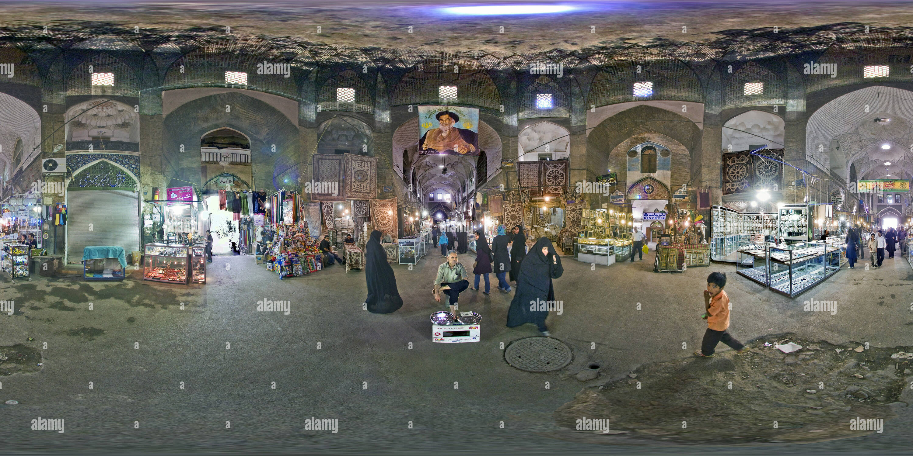 360° view of Seller under the portrait of the Ayatollah in the Bazaar ...