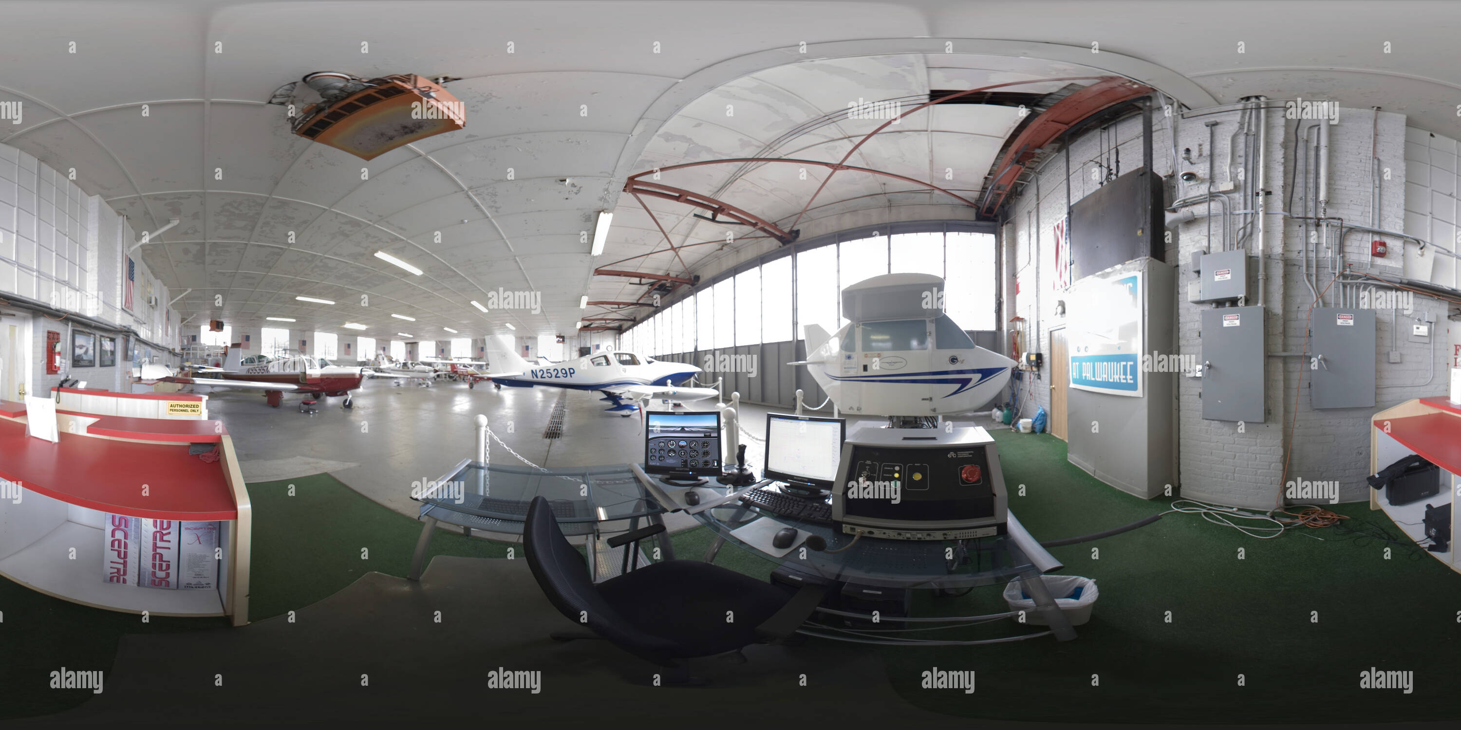 360° view of Flight Simmulator in a Cessna training facility / hanger ...
