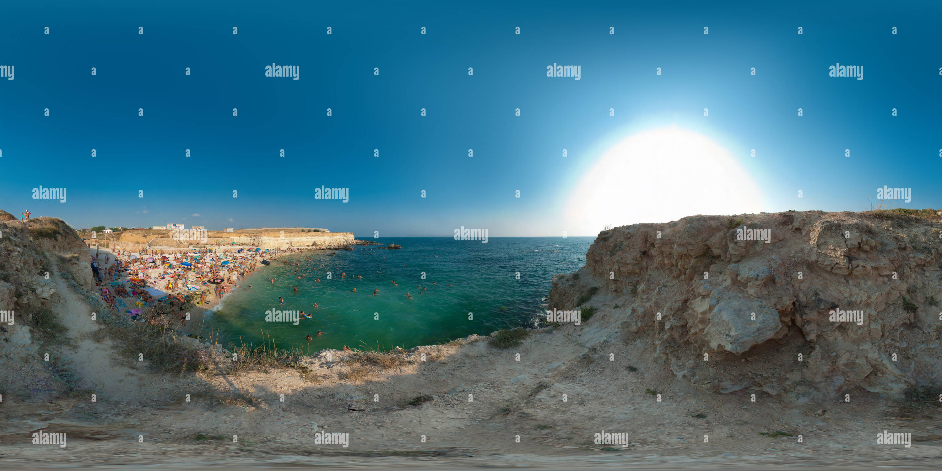 360° view of Blue bay beach people sun - Alamy