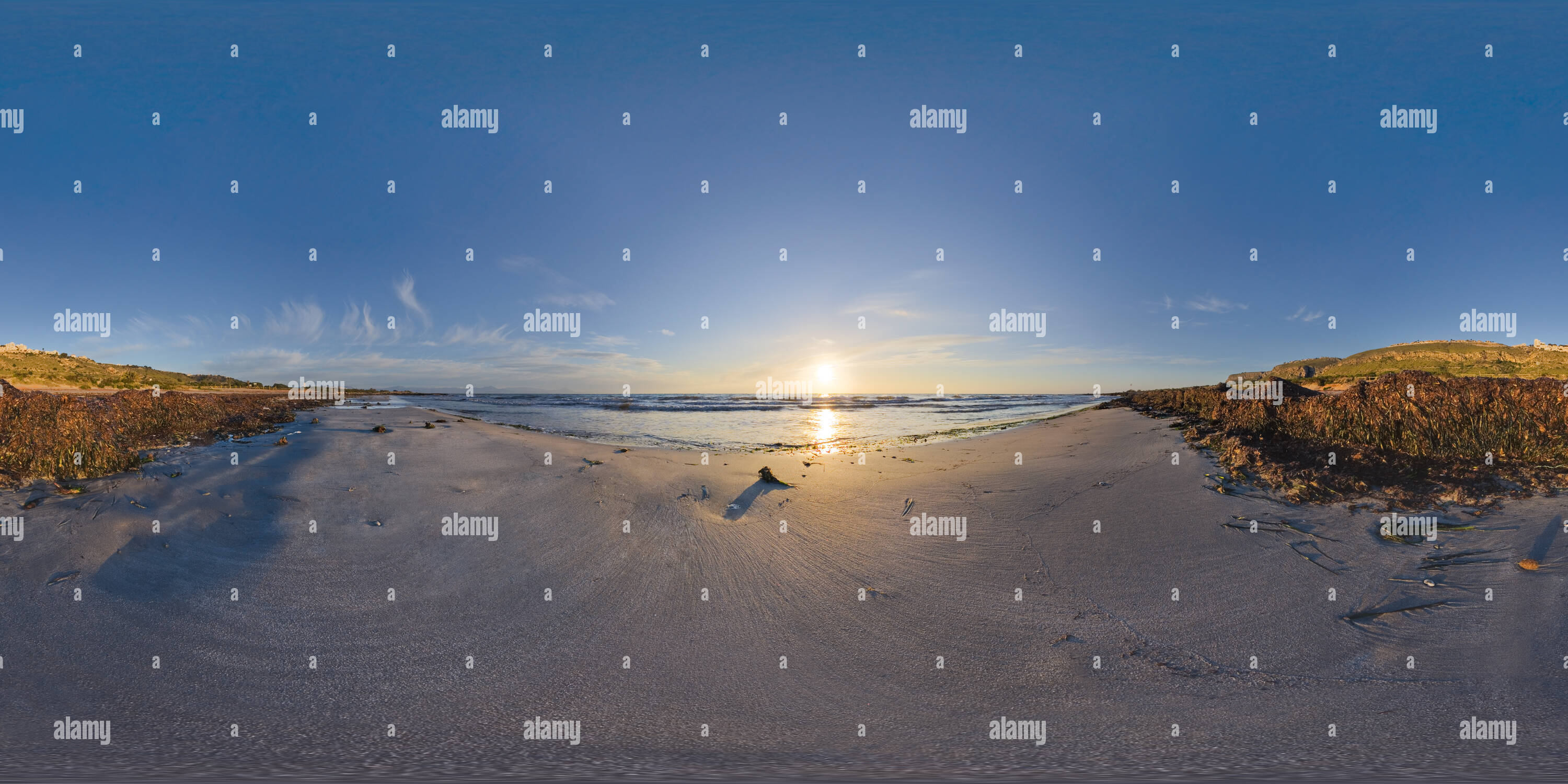 360° view of 1st springlights March 2011: Sunrise at sandy beach - Alamy