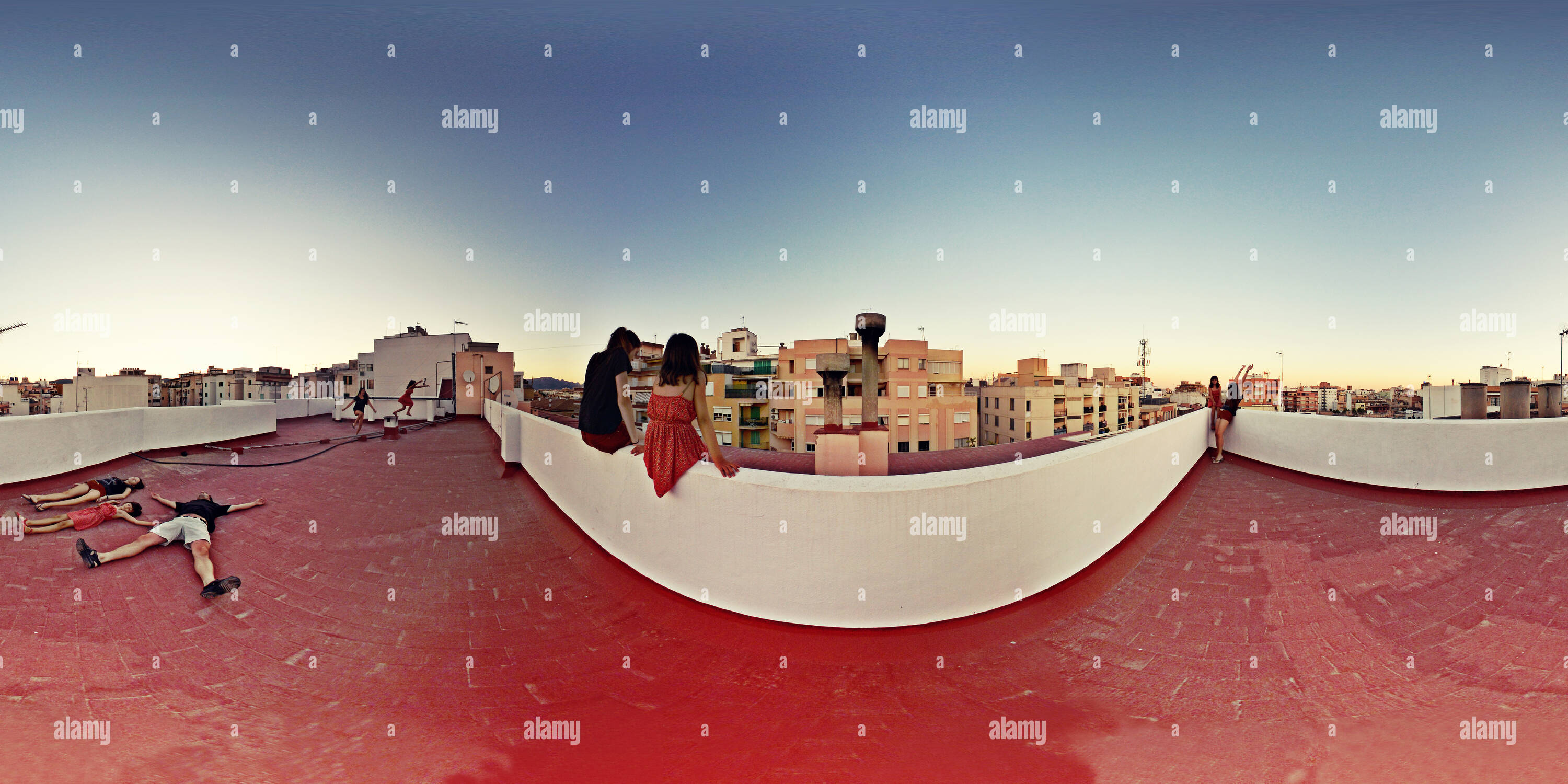 360° view of Red & blue sunset sky with girls and selfportrait - Alamy