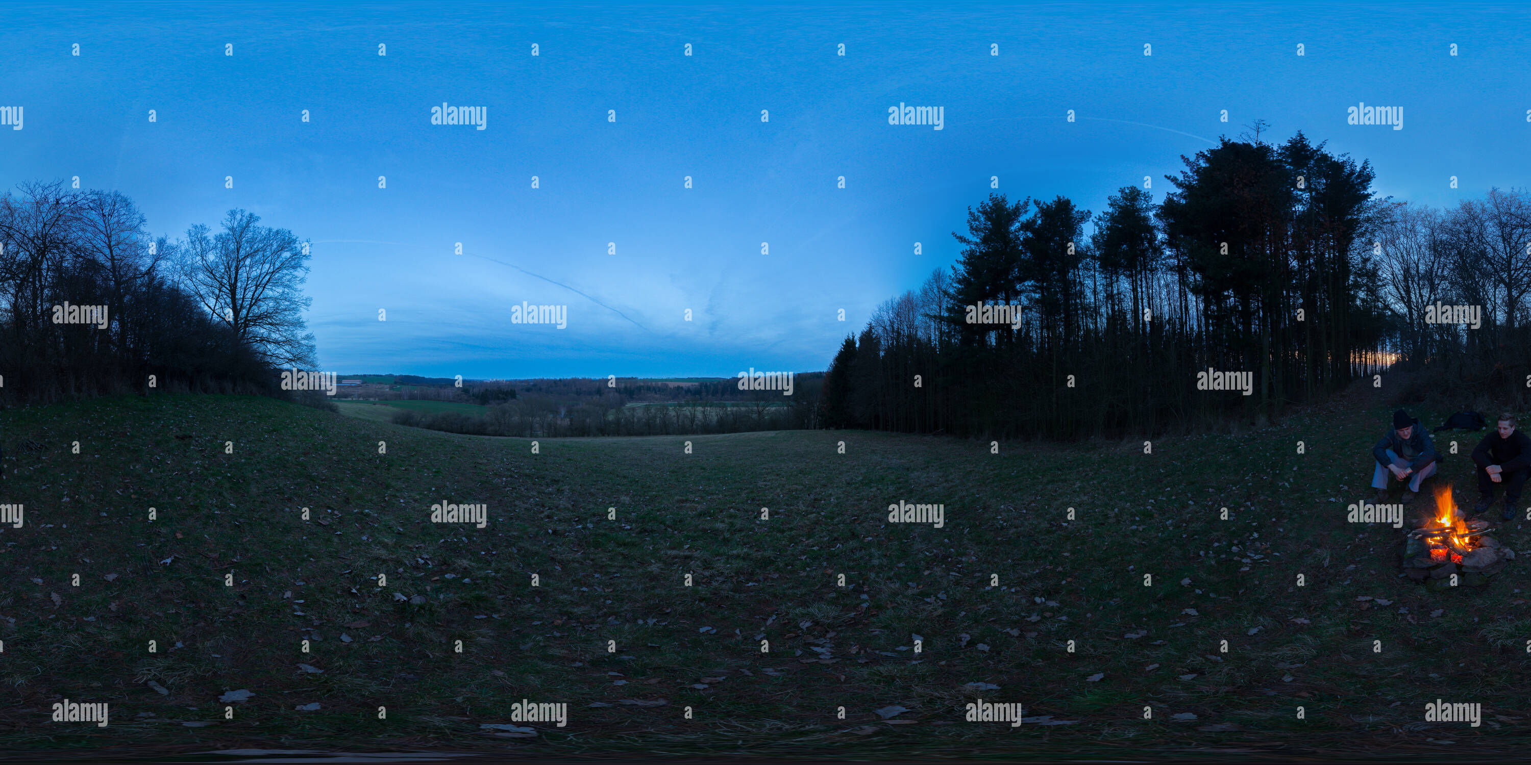 360° view of campfire on a hidden grassland at dusk, Czech Republic - Alamy