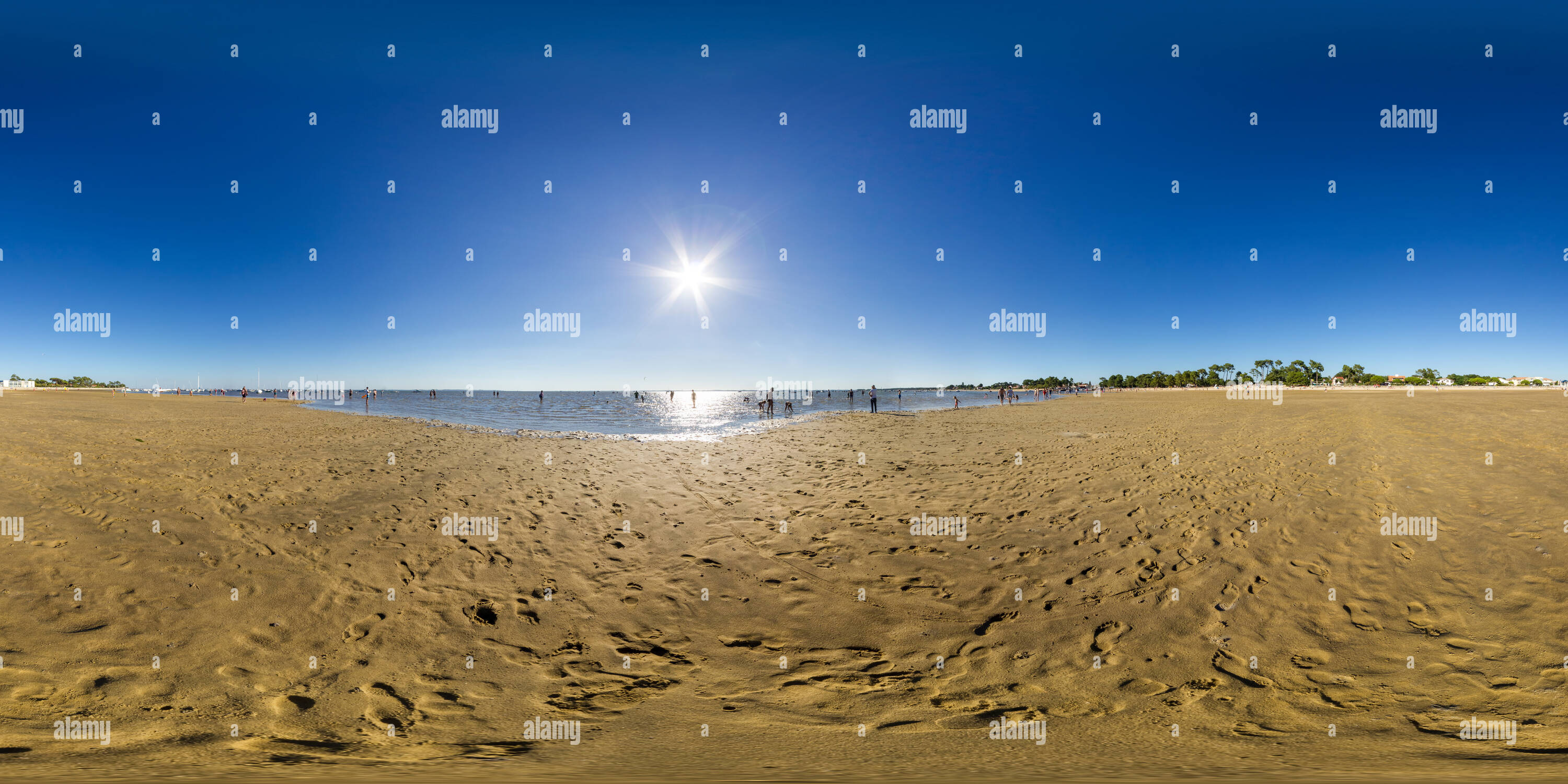 360° view of People at the beach in the touristic village of Andernos ...