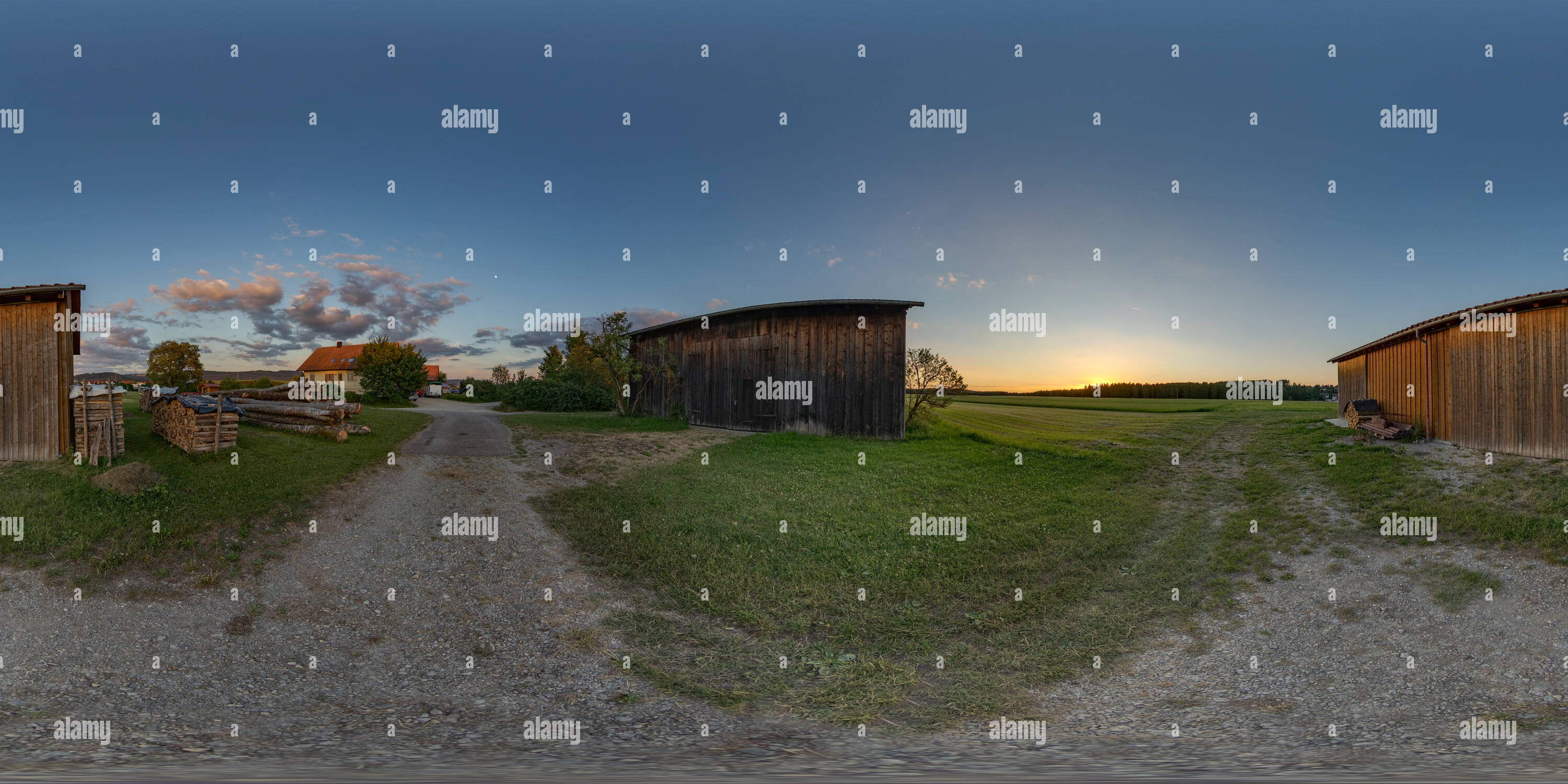360° view of German farm at sunset - Alamy