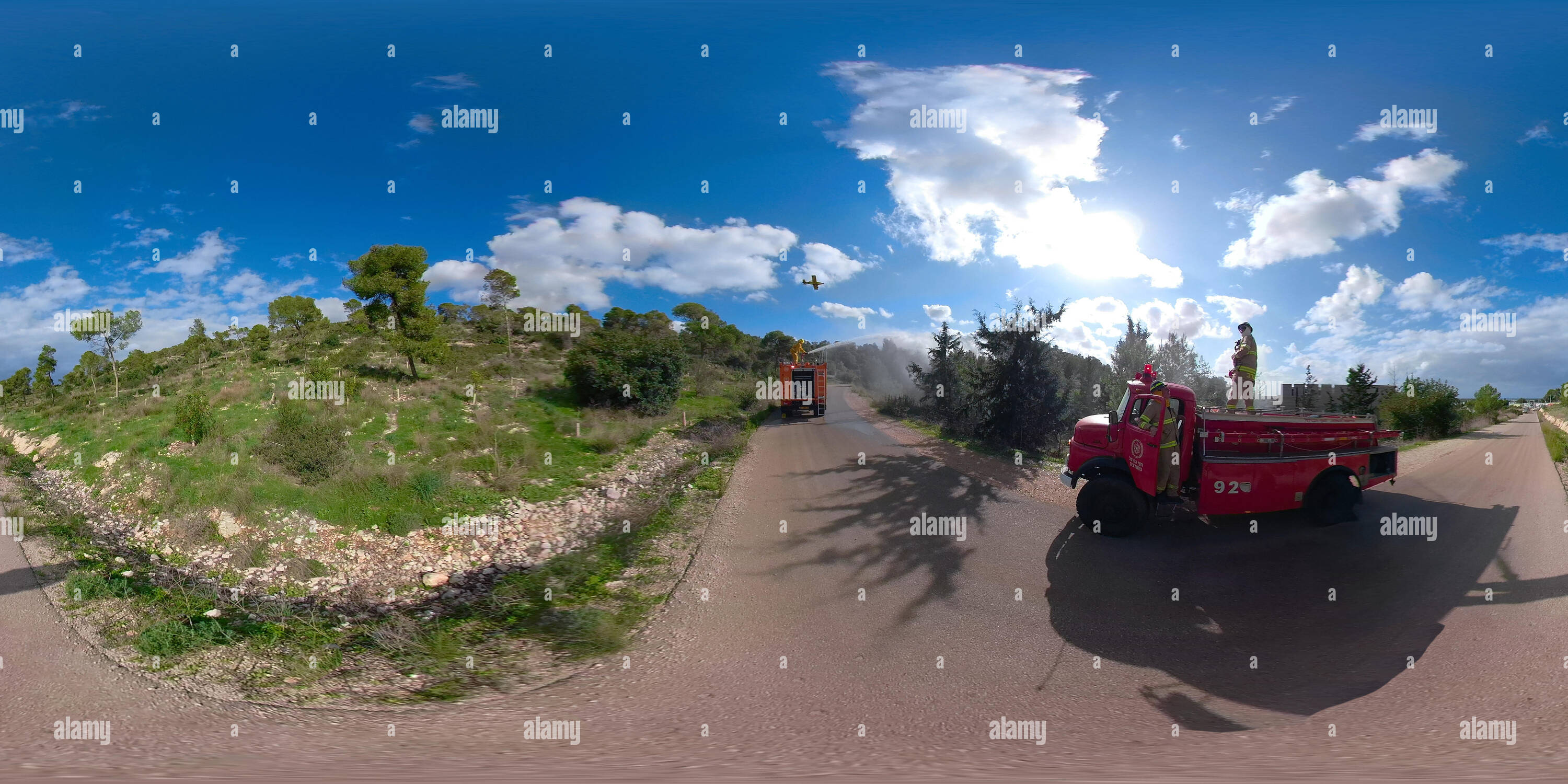 360° view of Firefighting airtanker drop fire retardant on burning ...